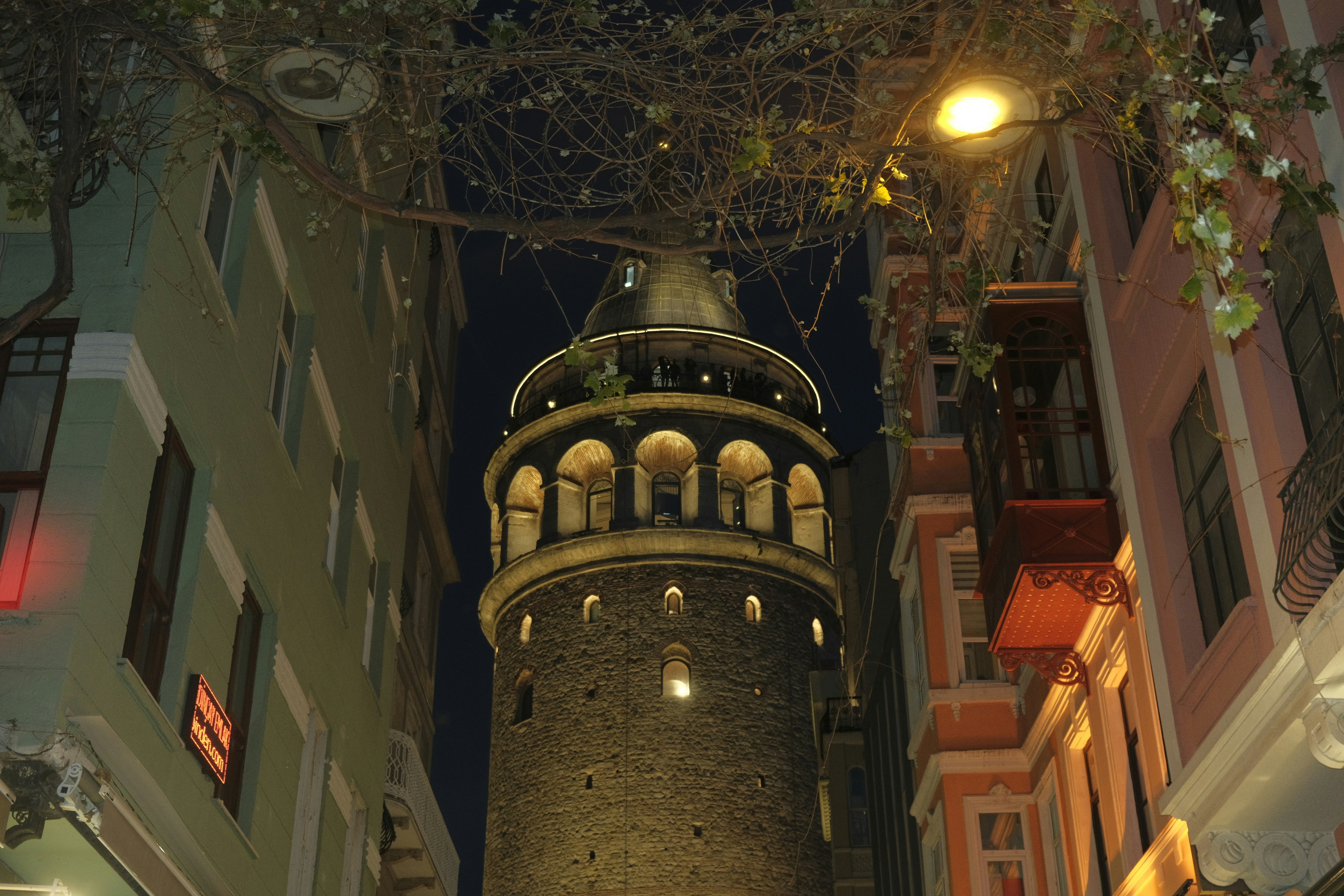 Towered Night: The Circular Keep Basking in Lantern Light