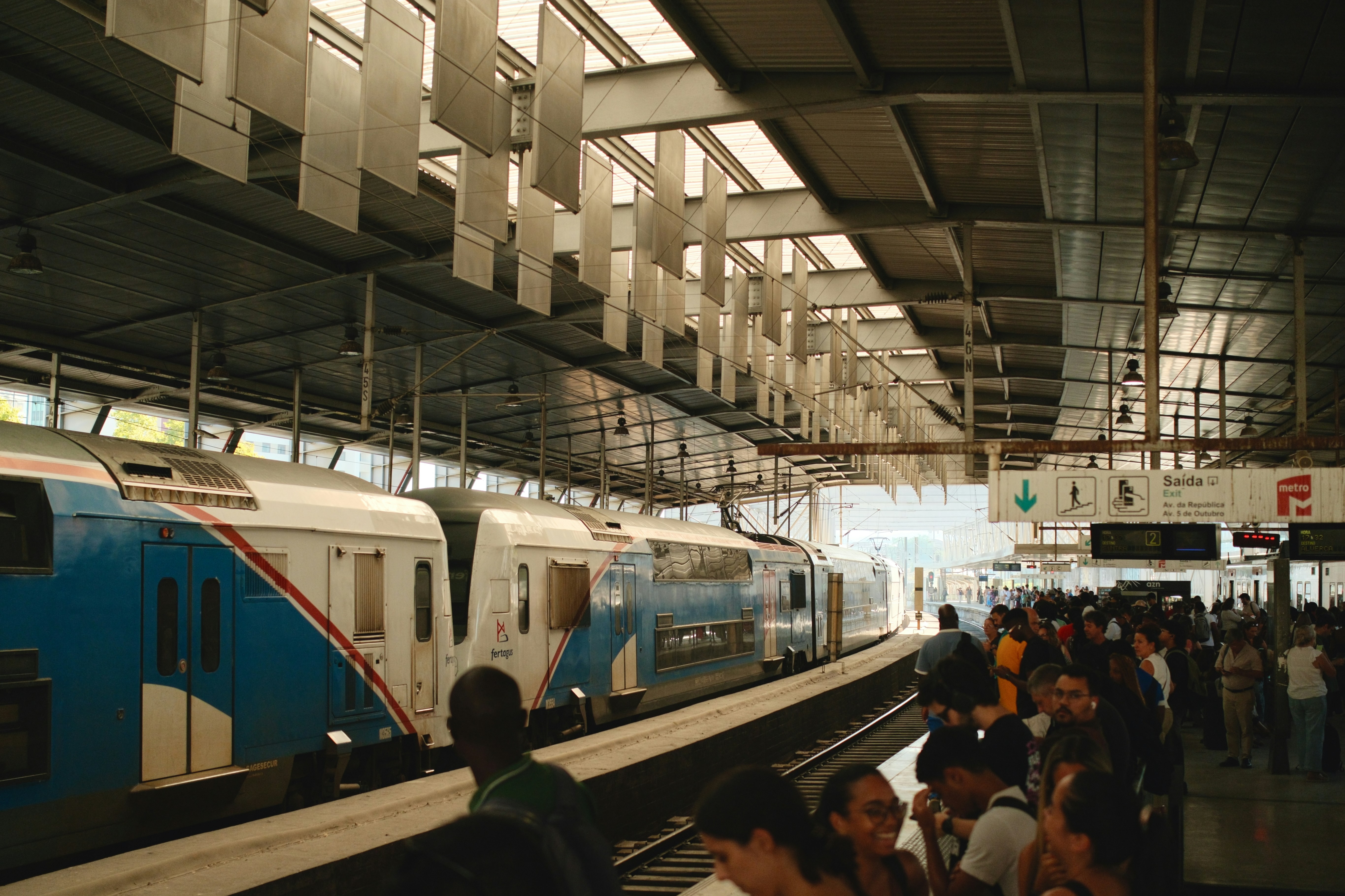 Platform Pulse: Trains, Tracks, and a Crowded Moment at Dusk