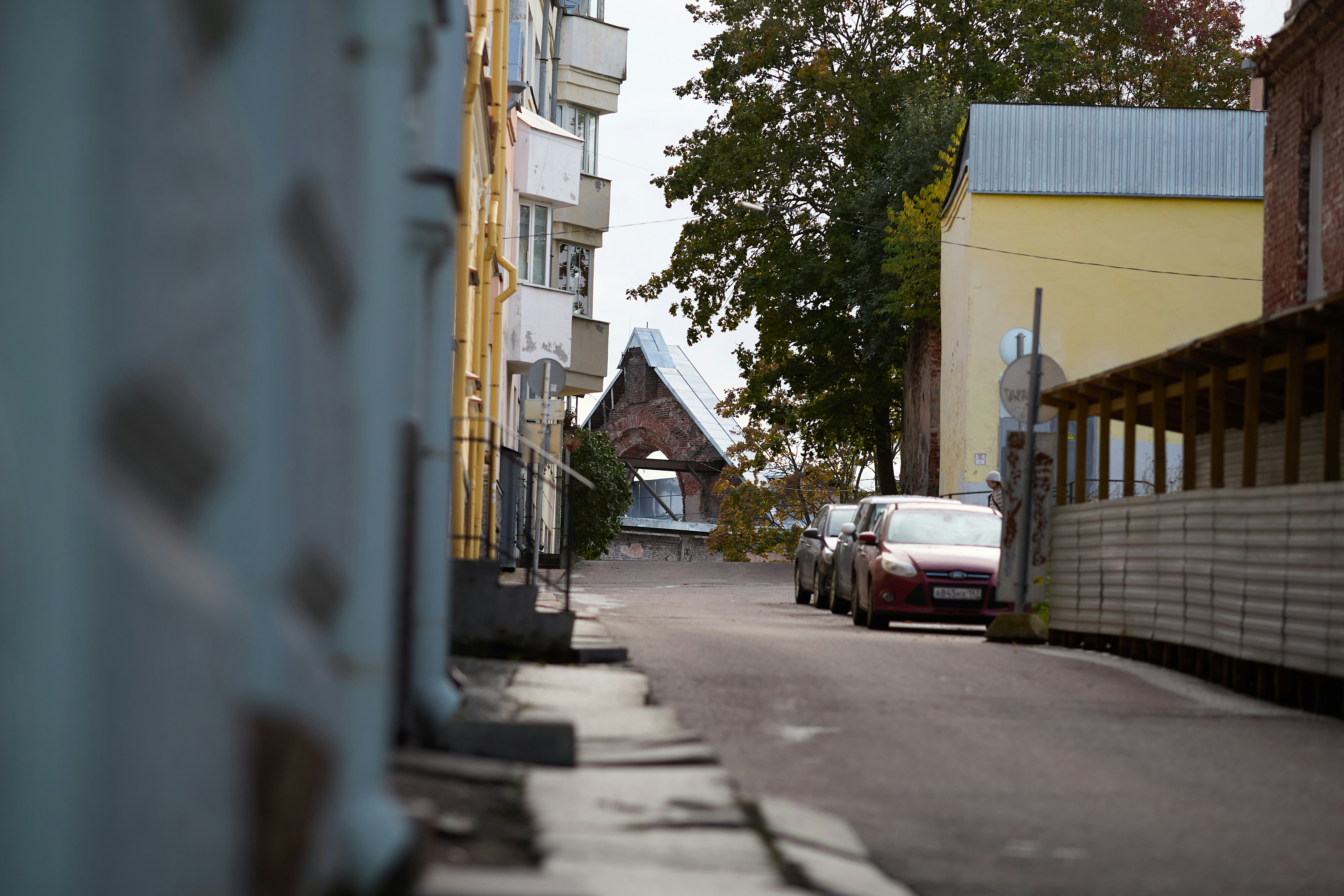 Silent Lane: A Narrow Street Framed by Quiet Facades