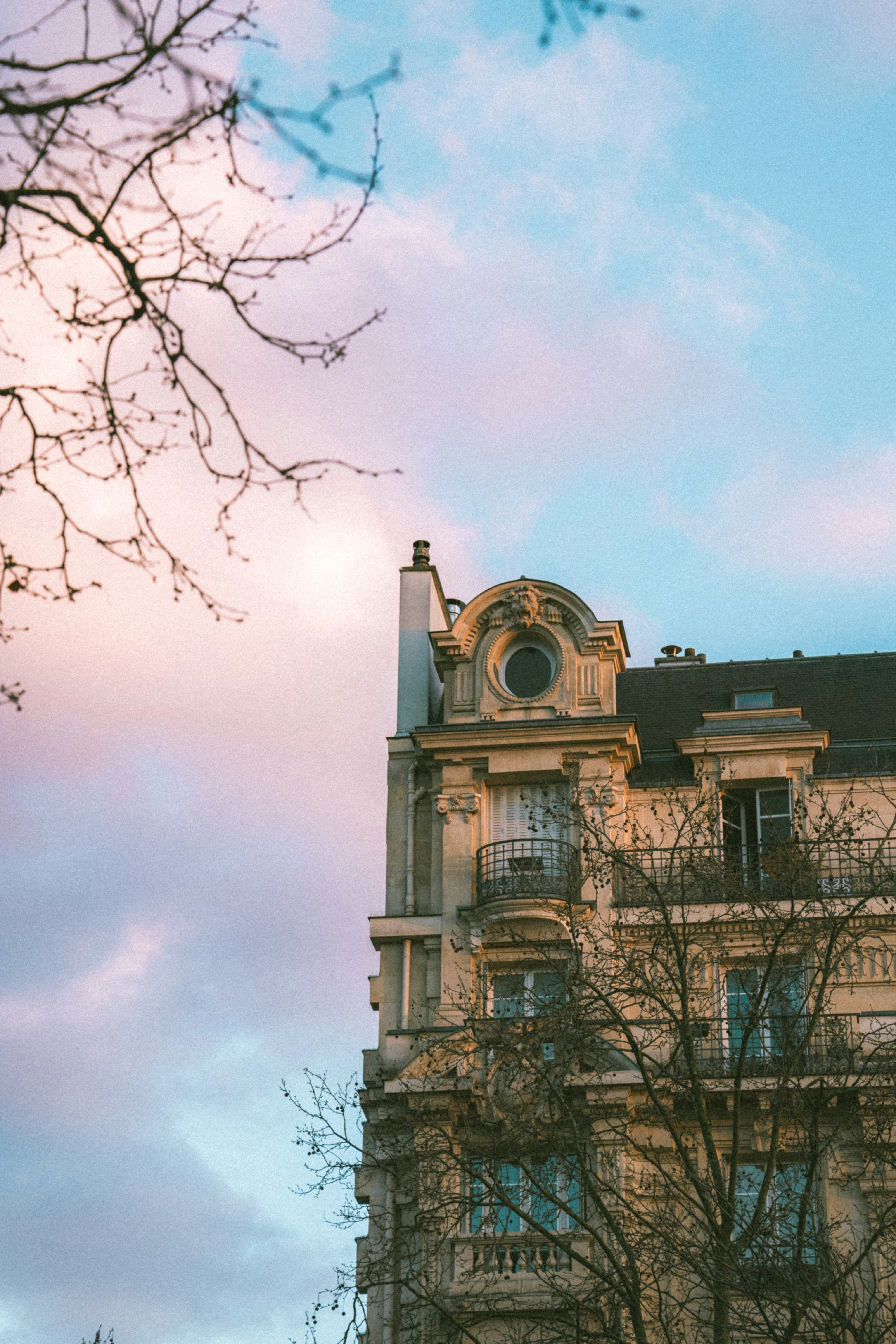 Facade of a Parisian Corner: Twilight Meets Architecture