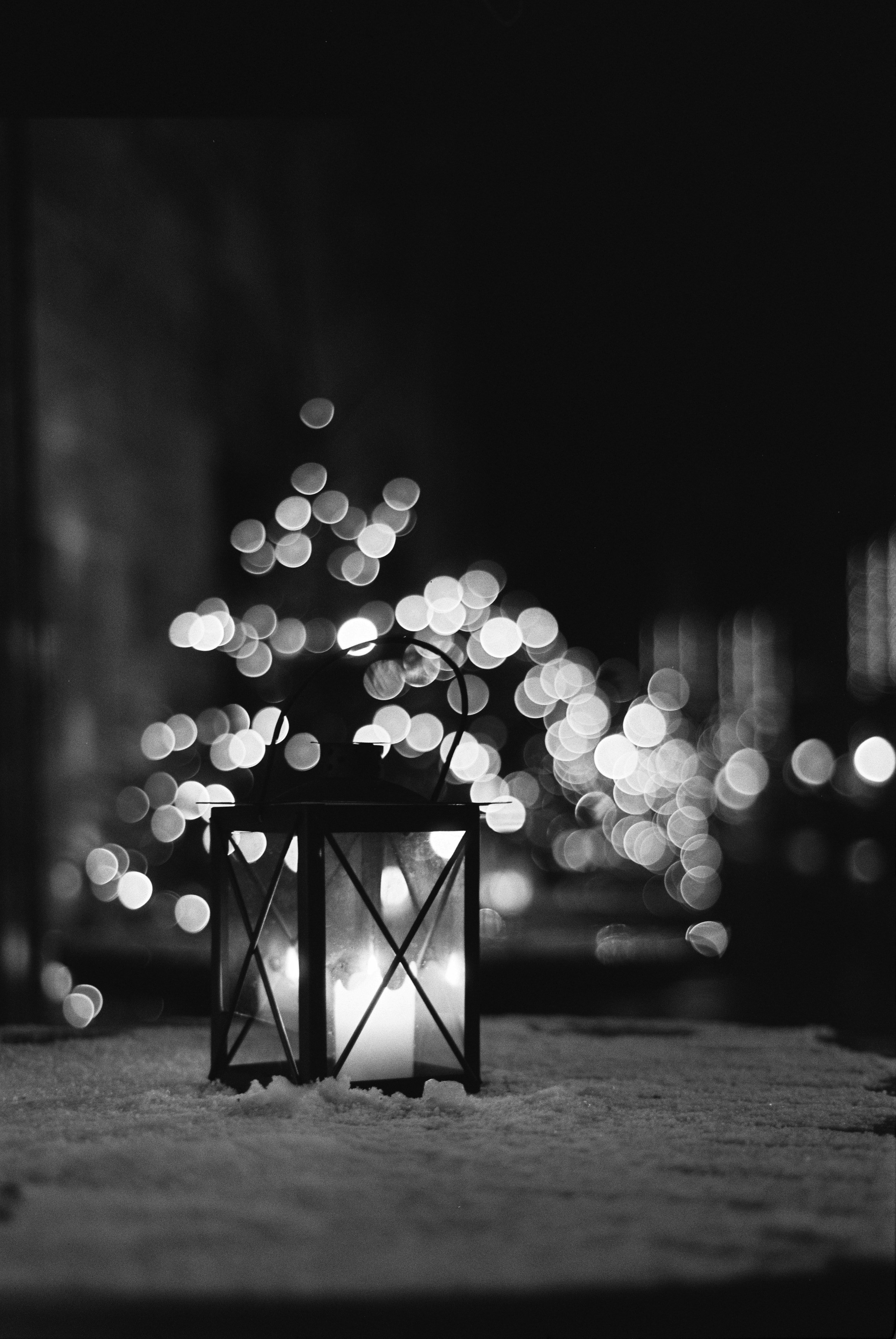 Lantern glow on a quiet winter street