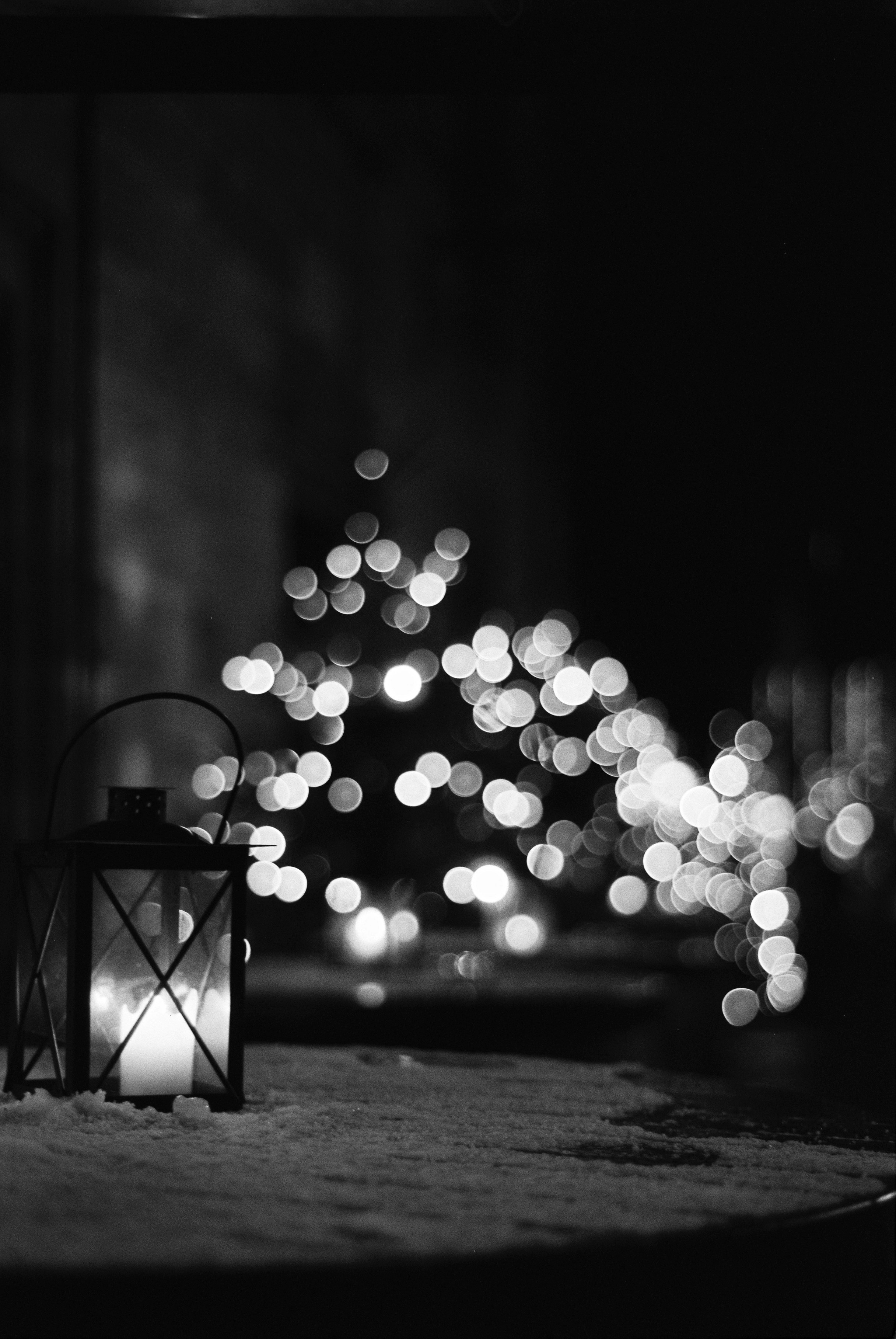 Lantern Glow: Bokeh River of Light and Snow