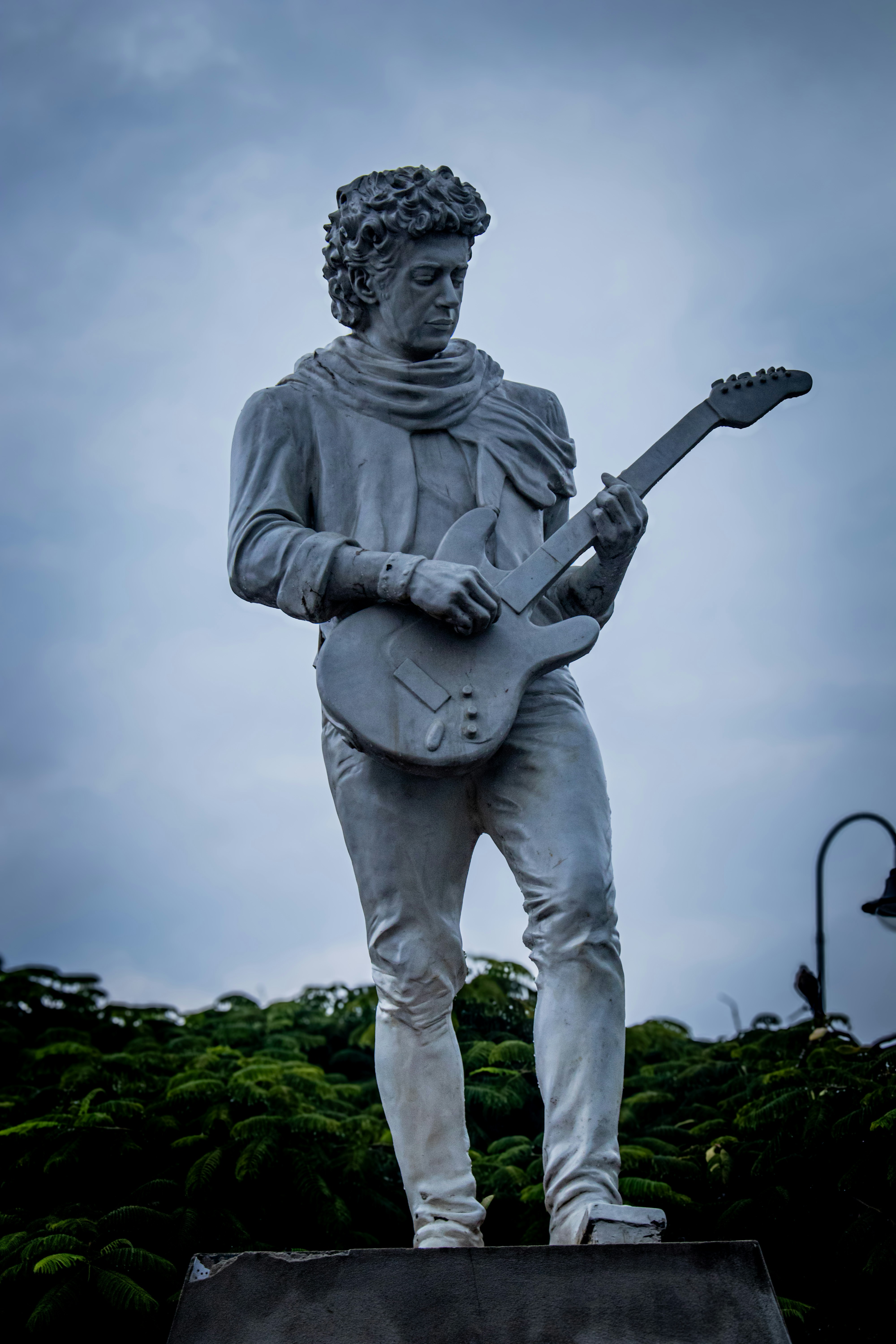 Guitar Hero on Granite: A Stony Statue Strums into the Sky