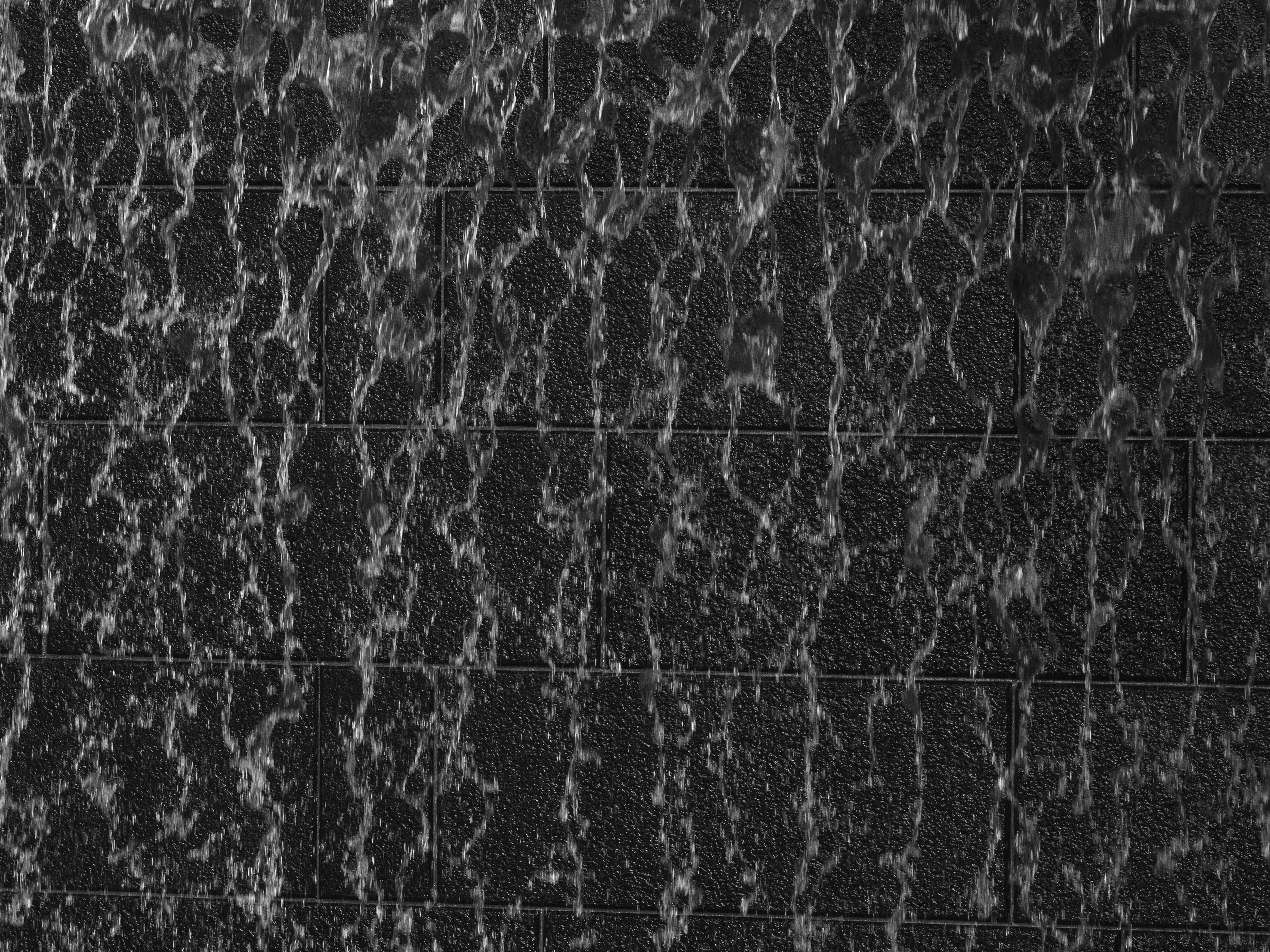 Texture in the Rain: A Facade of Wet Granite