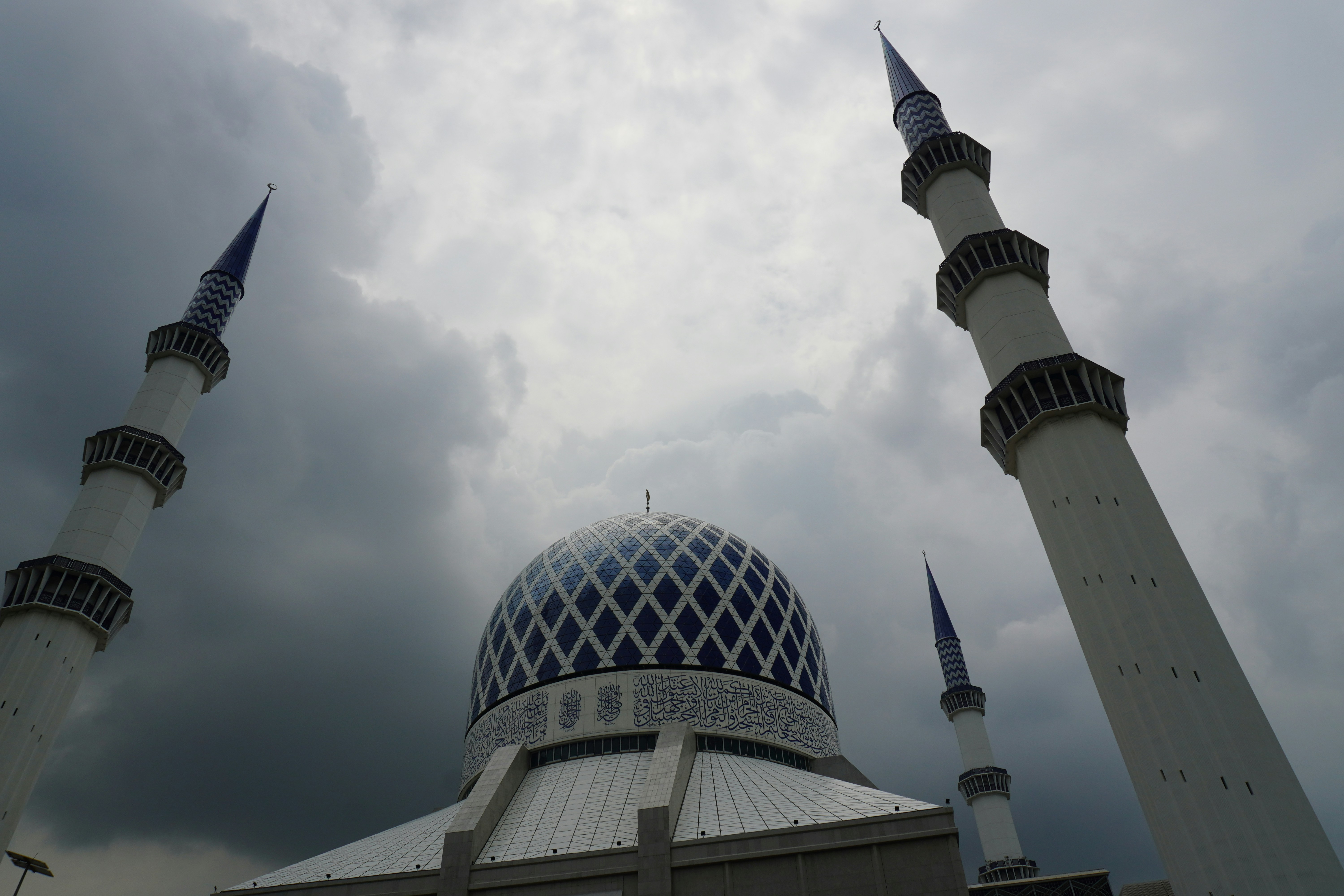 Dome and Minarets Under Stormy Skies