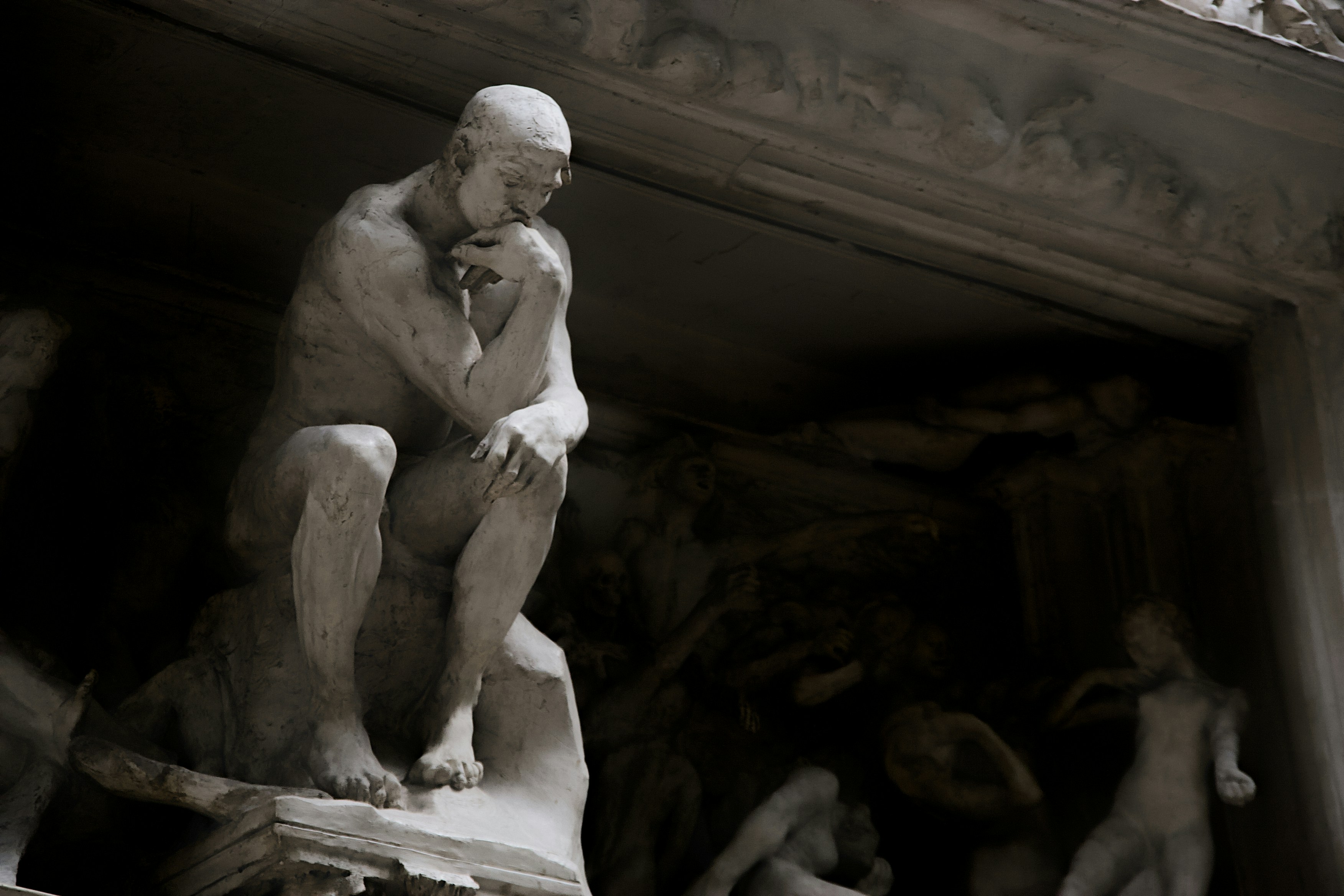 Contemplation in Stone: A Quiet Moment on the Pedestal