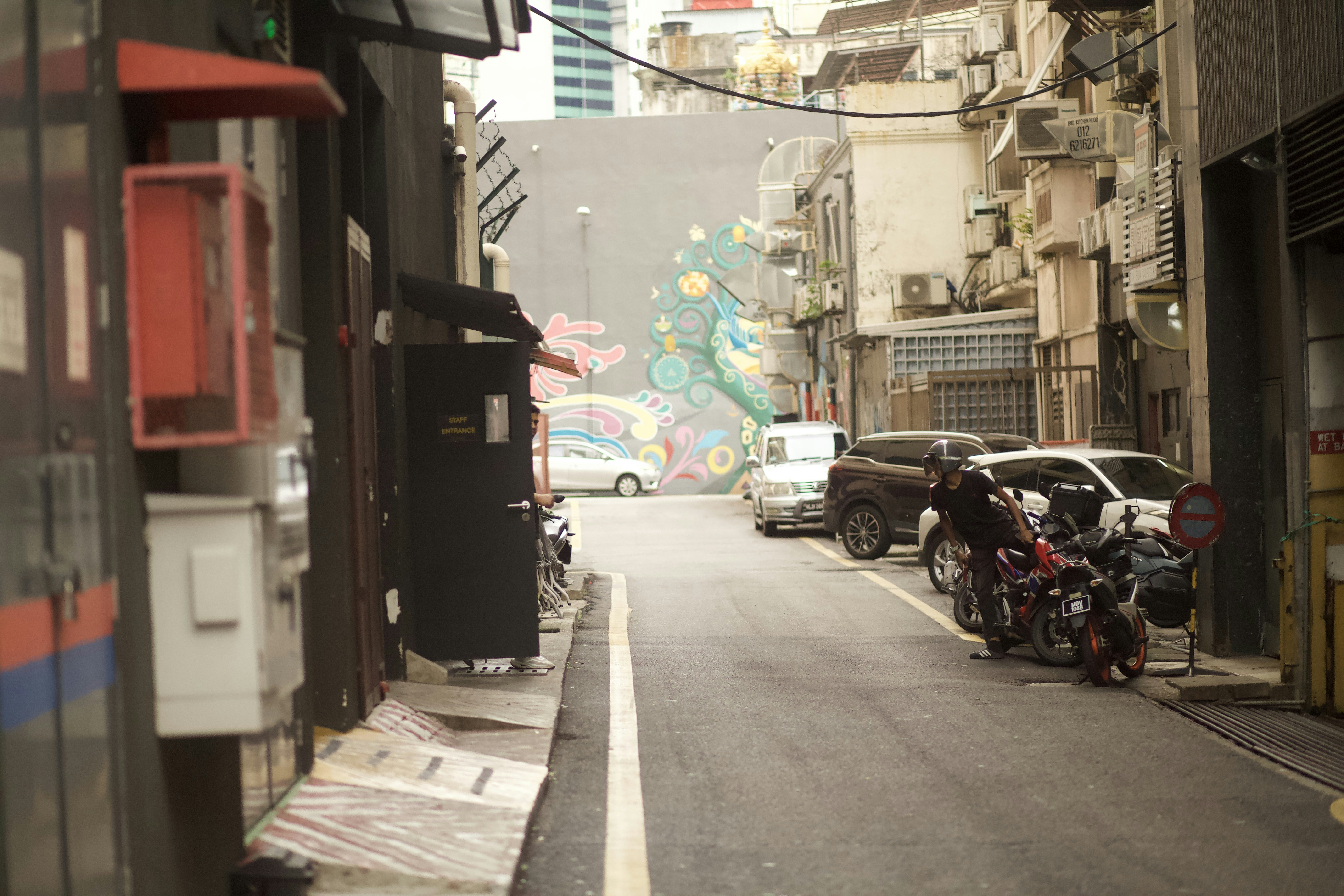 Neon Alleyway: Colorful Street Mural Framed by Urban Quiet