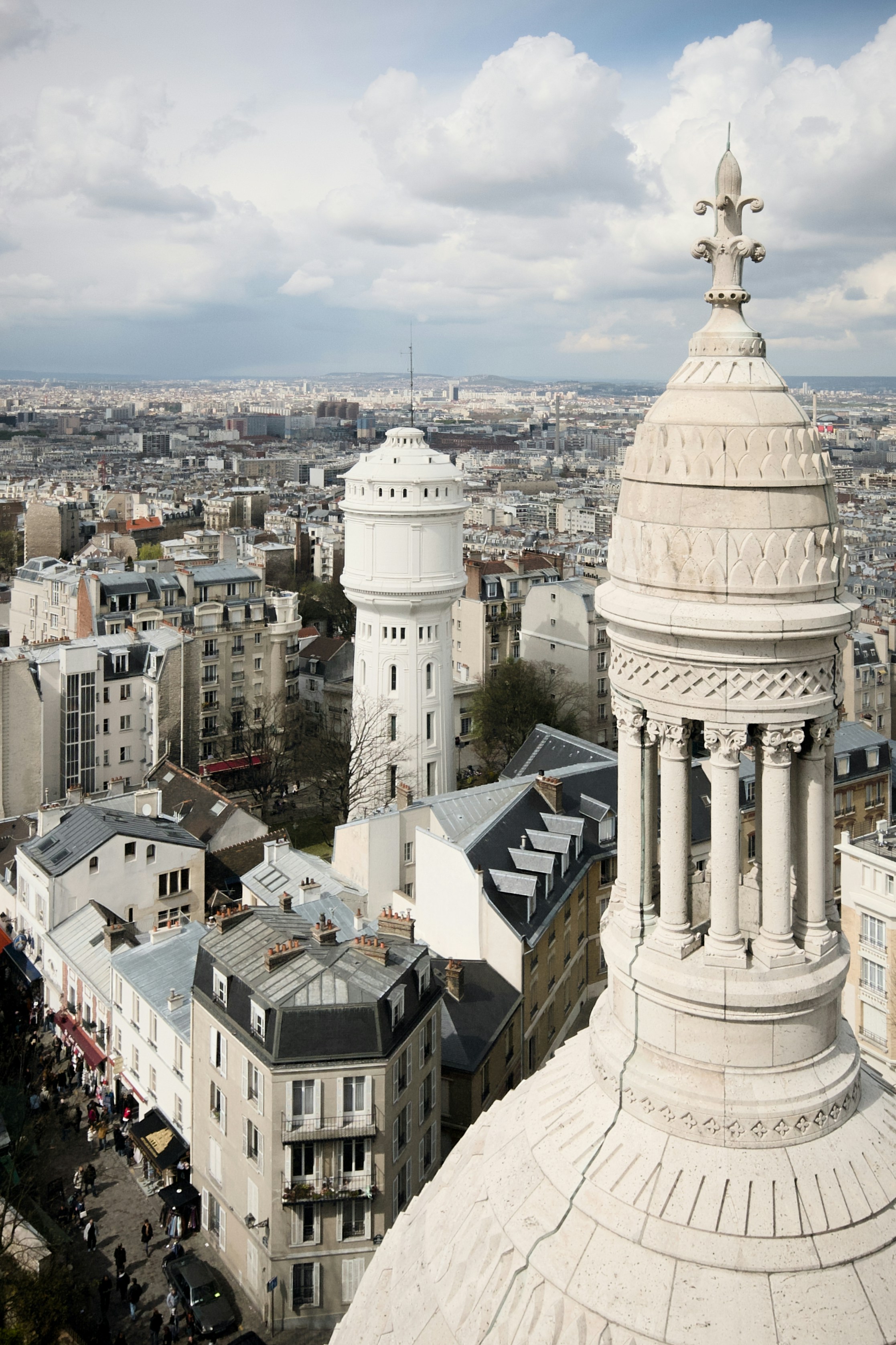 Dome and City: A Rooftop Vantage Over Parisian Streets