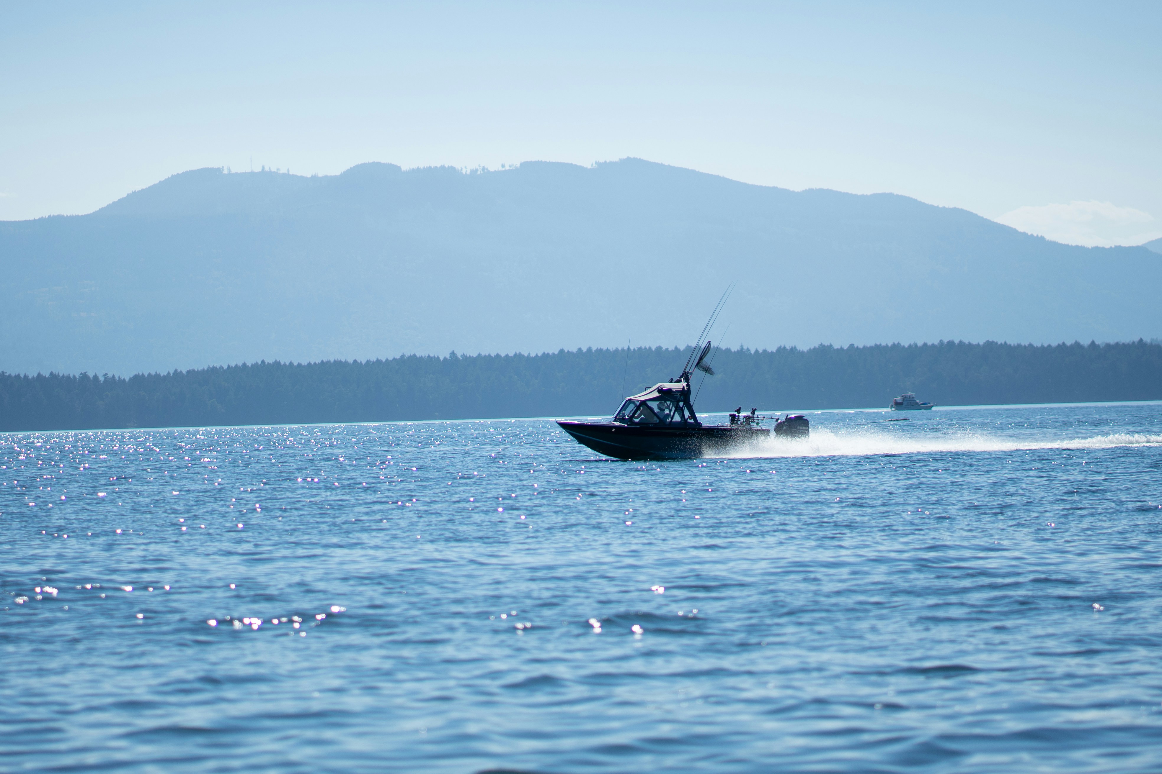 Moonlit Wake: A Seafaring Glide Across a Quiet Lap of Water