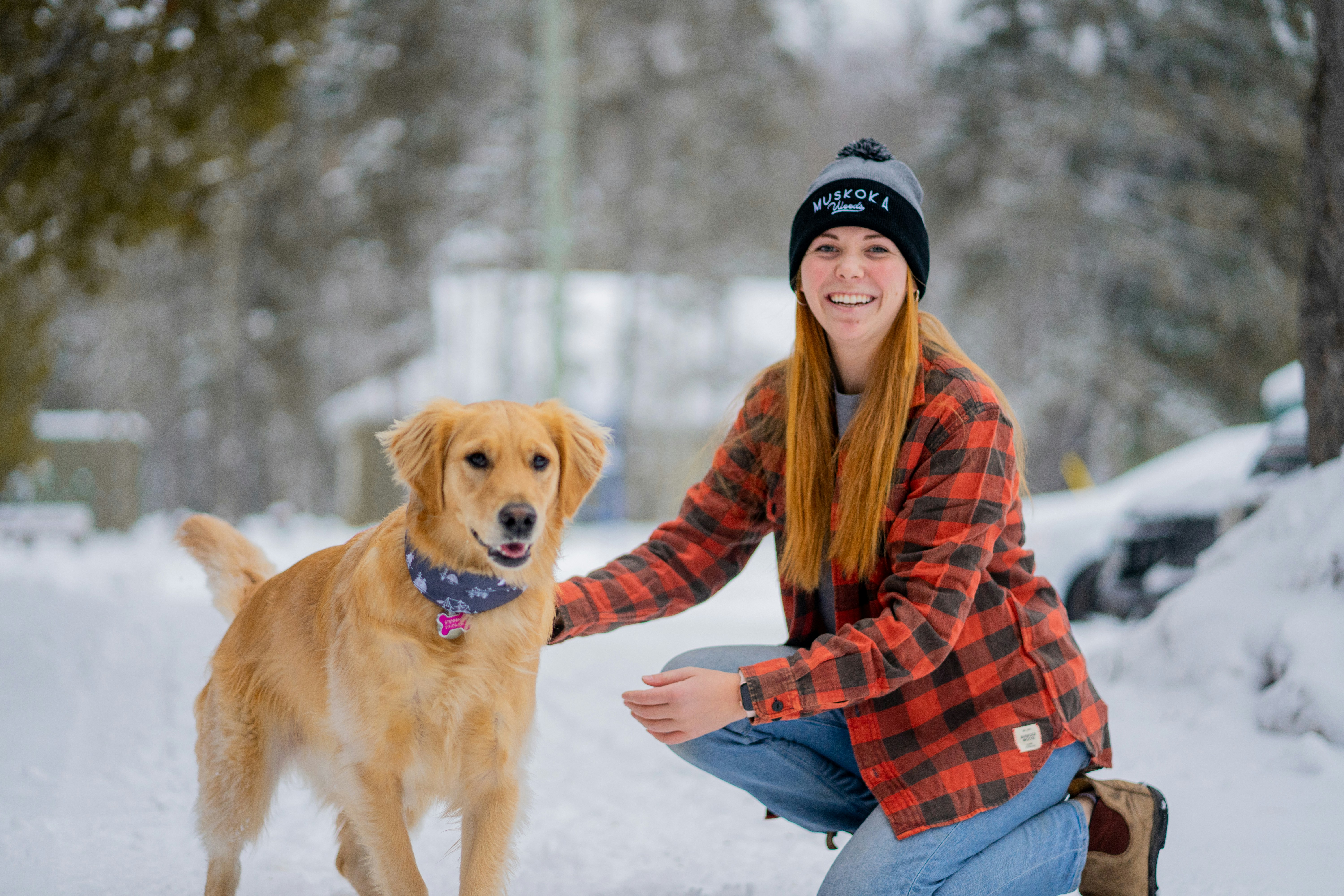 Winter Bond: A Girl and Her Golden Friend in Fresh Snow