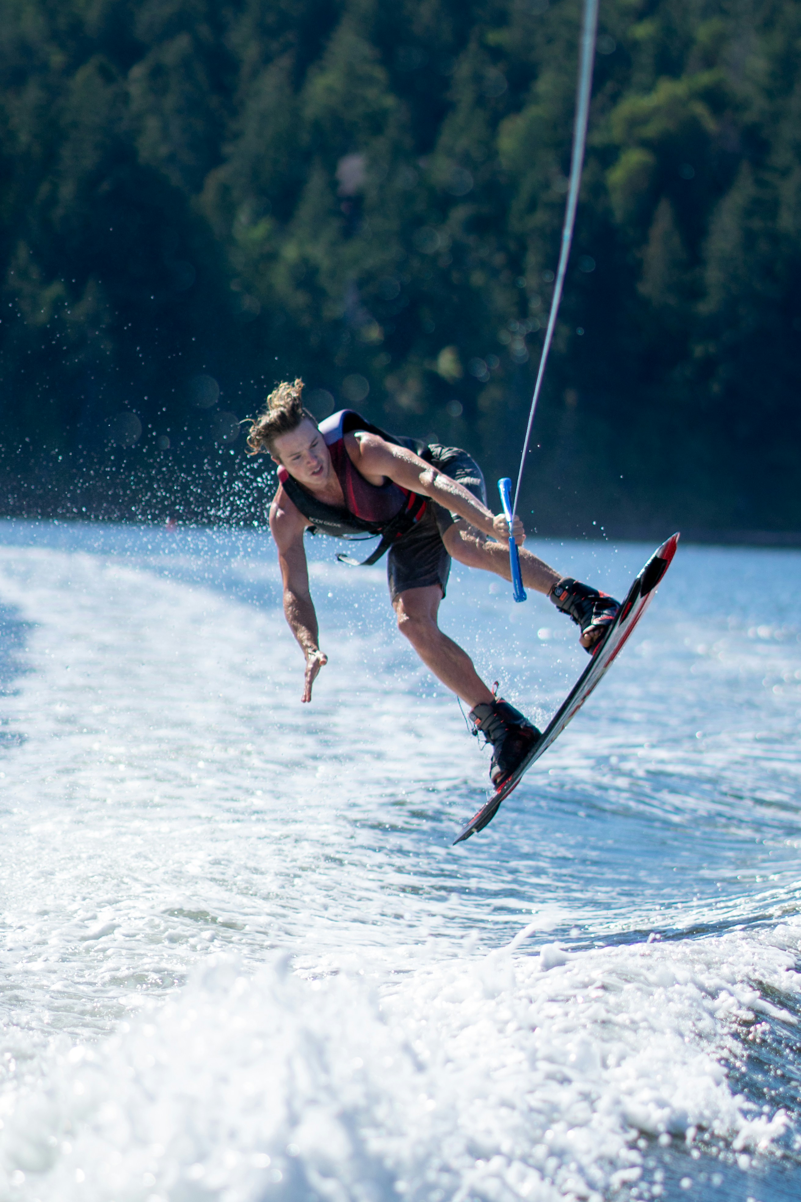 Airborne Wake: A Boarder Moments Above the Cresting Tide