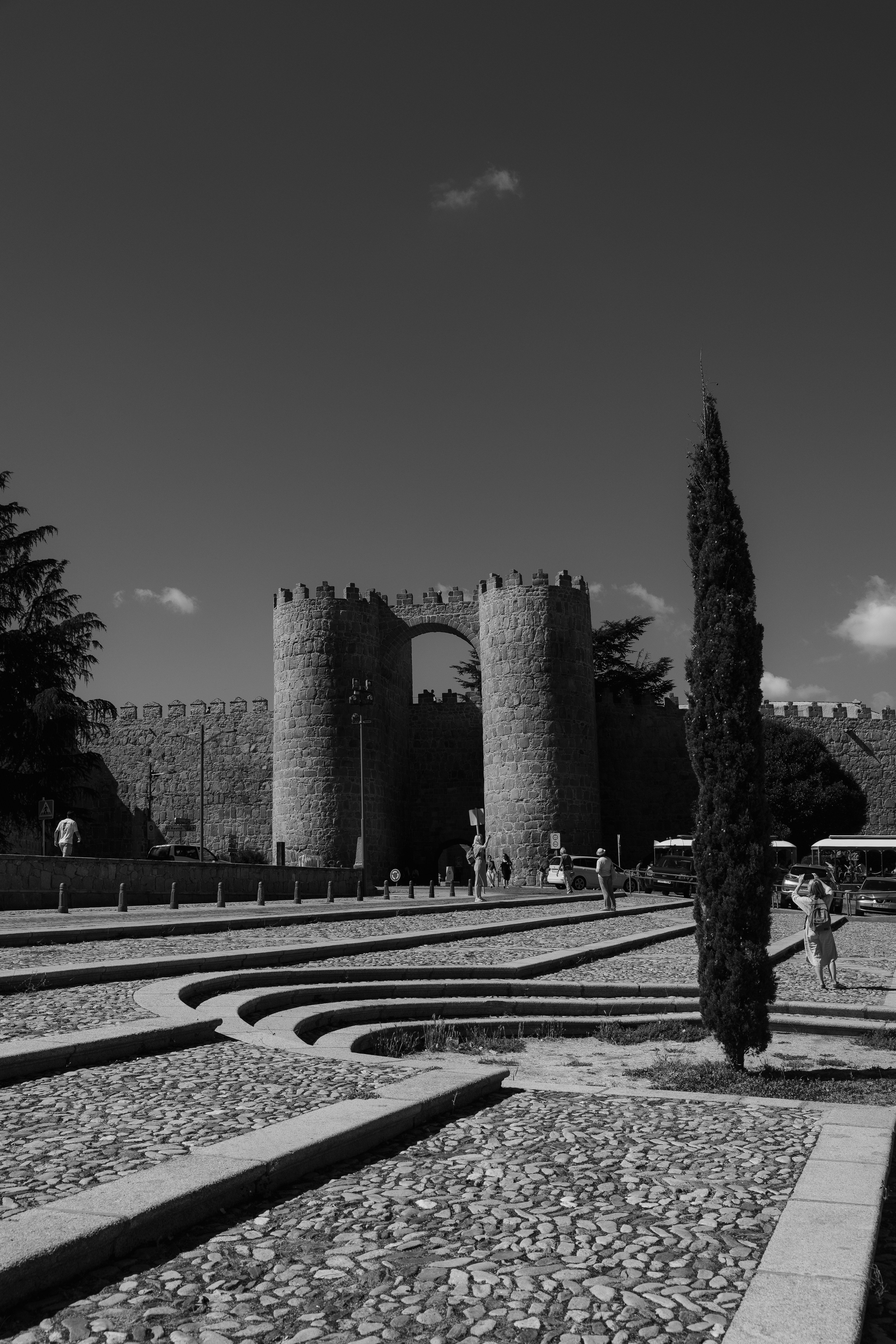 Gatehouse Echoes: Ancient Walls Framing a Quiet Parade