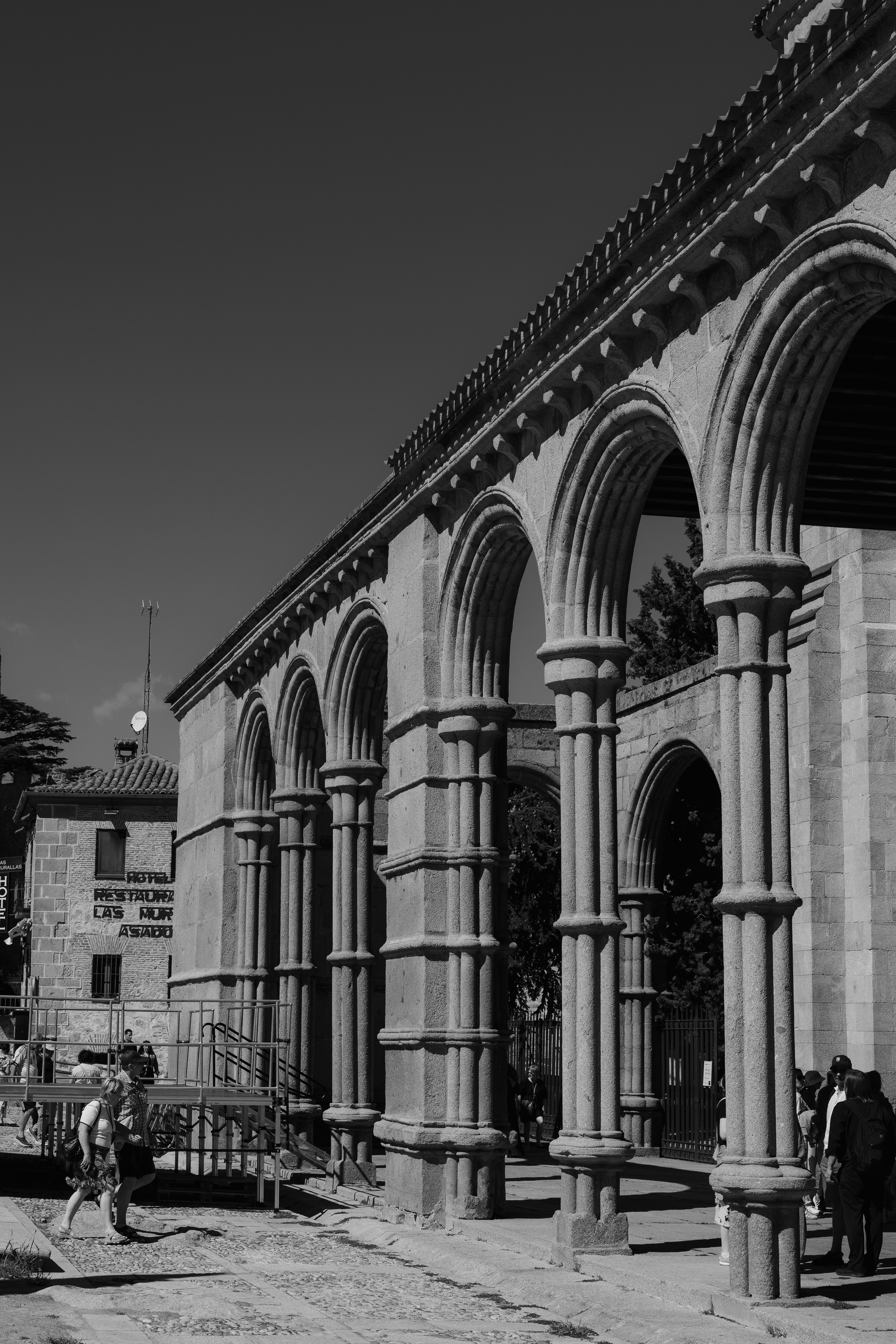 Arcade of Shadows: Stone Arches and Quiet Motion