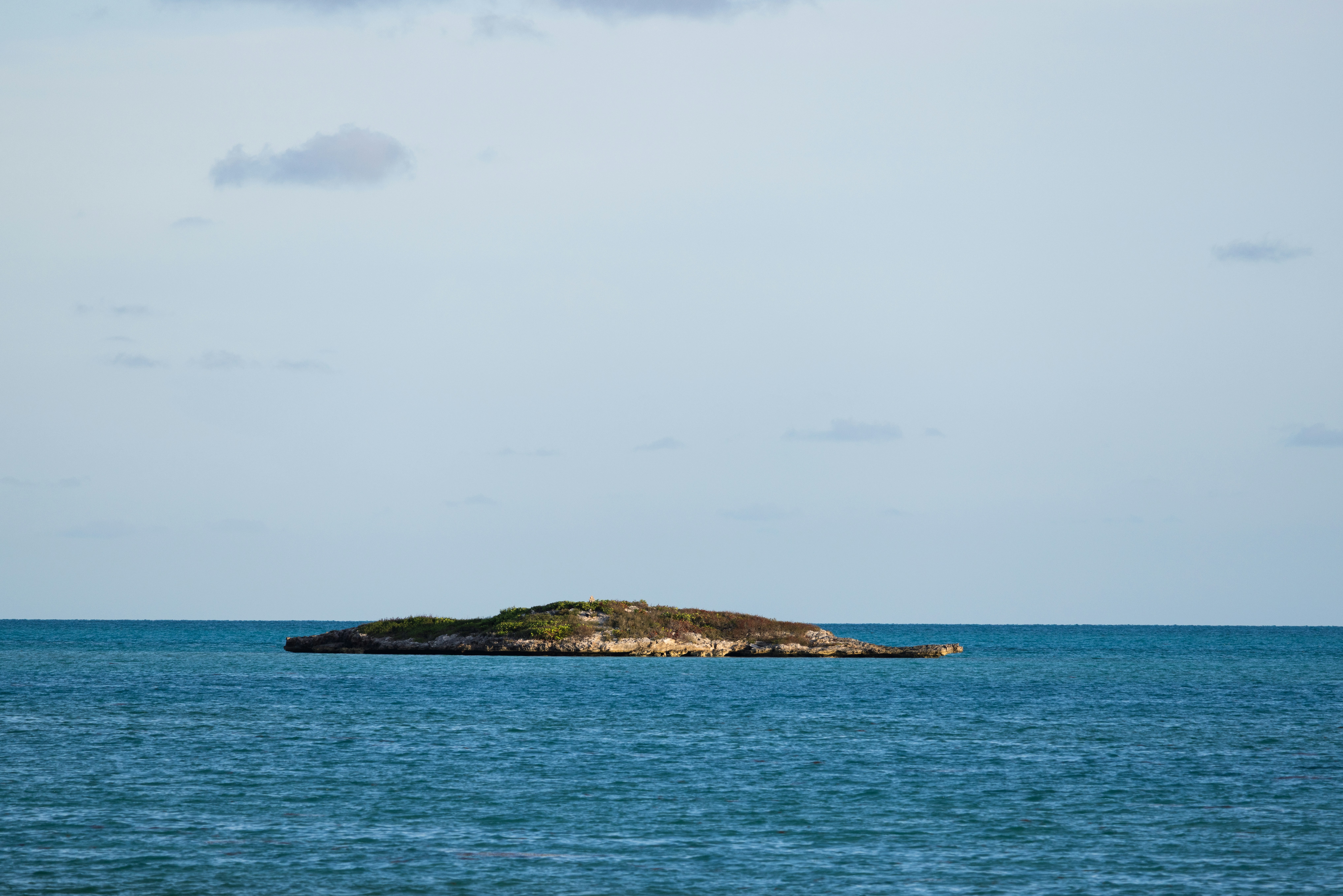 Isolated Island: A Quiet Veil of Sea and Sky