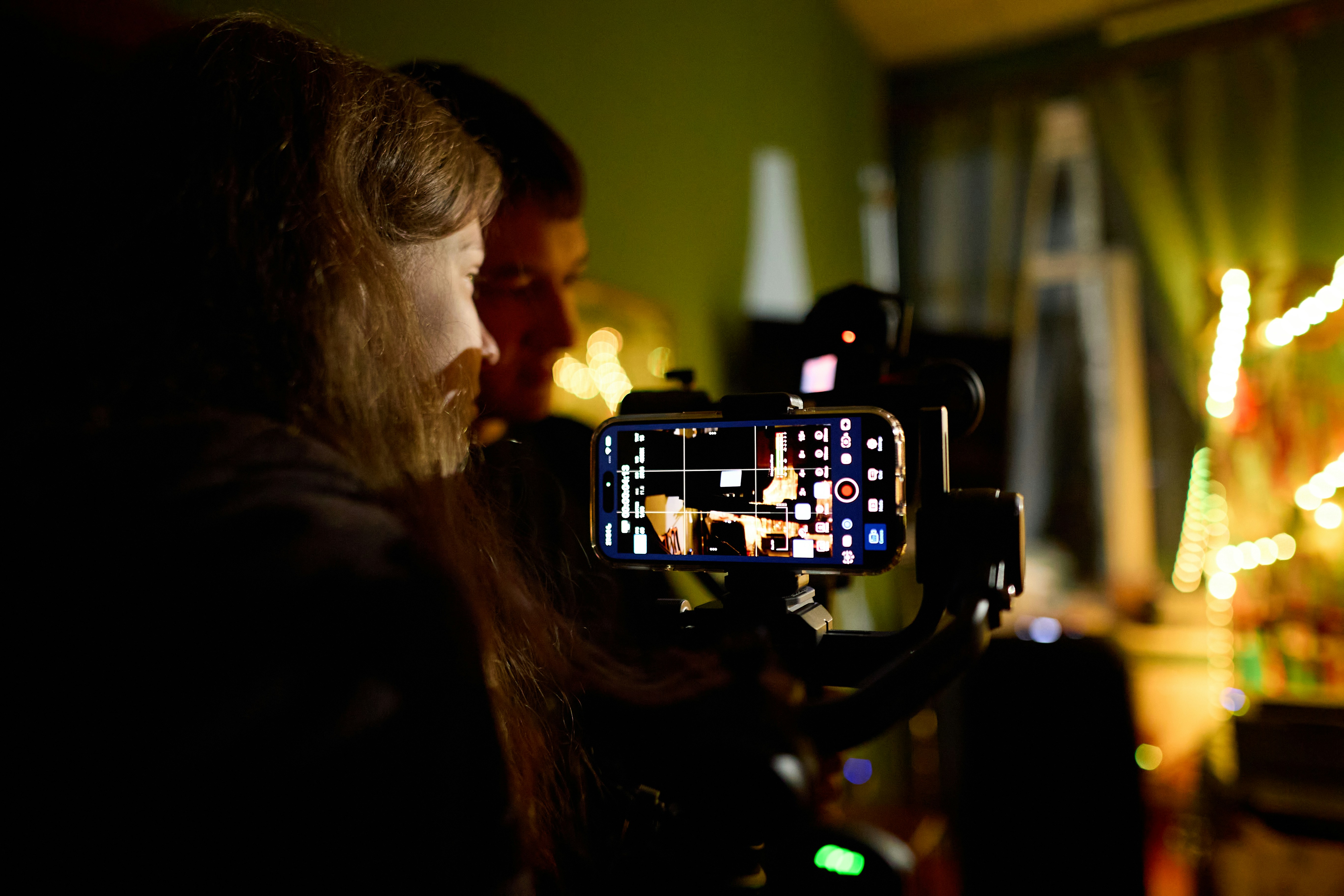 Phone Screen Portrait: A Night Shoot Framed by Live Neon