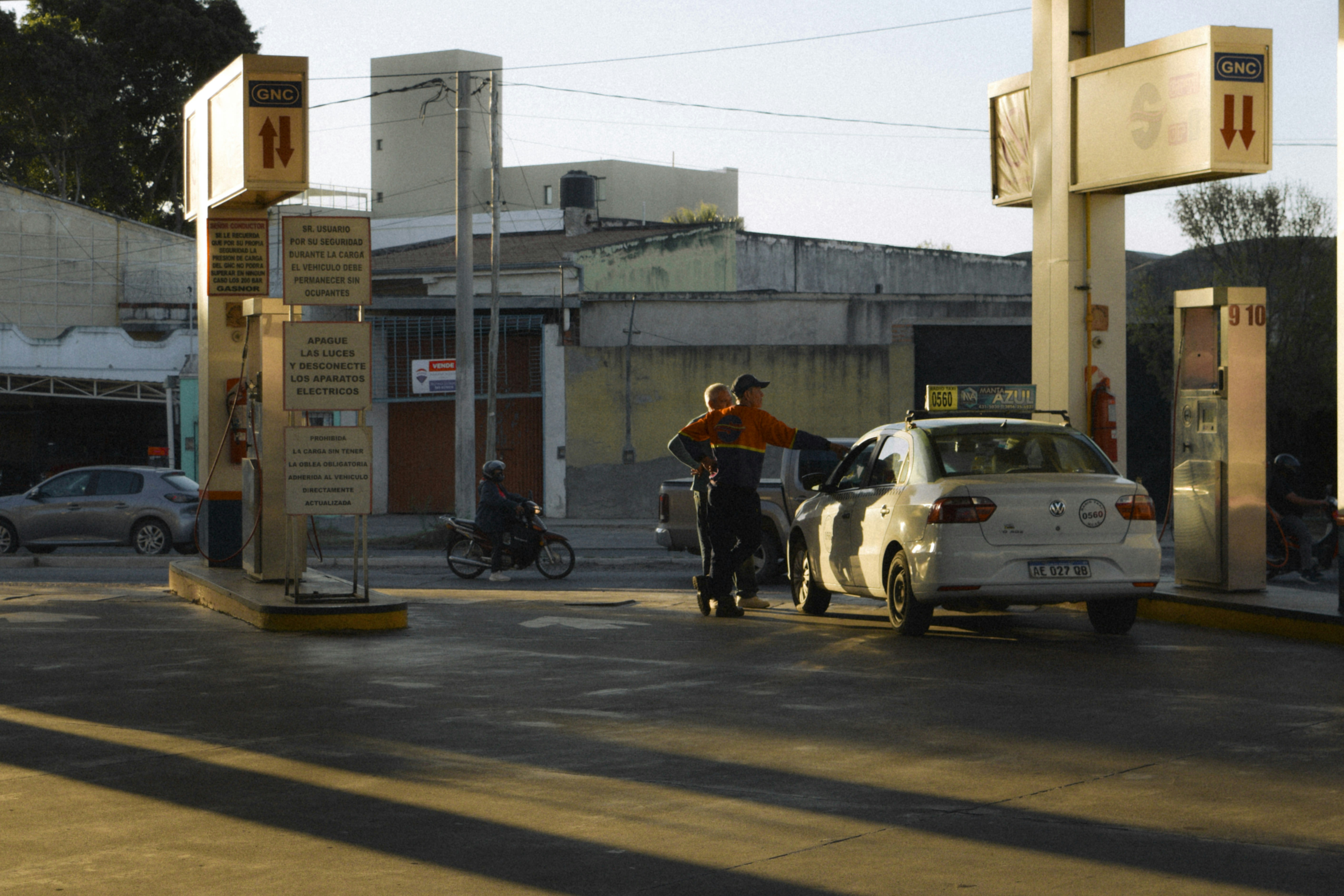 Gas Station Interaction at Golden Hour