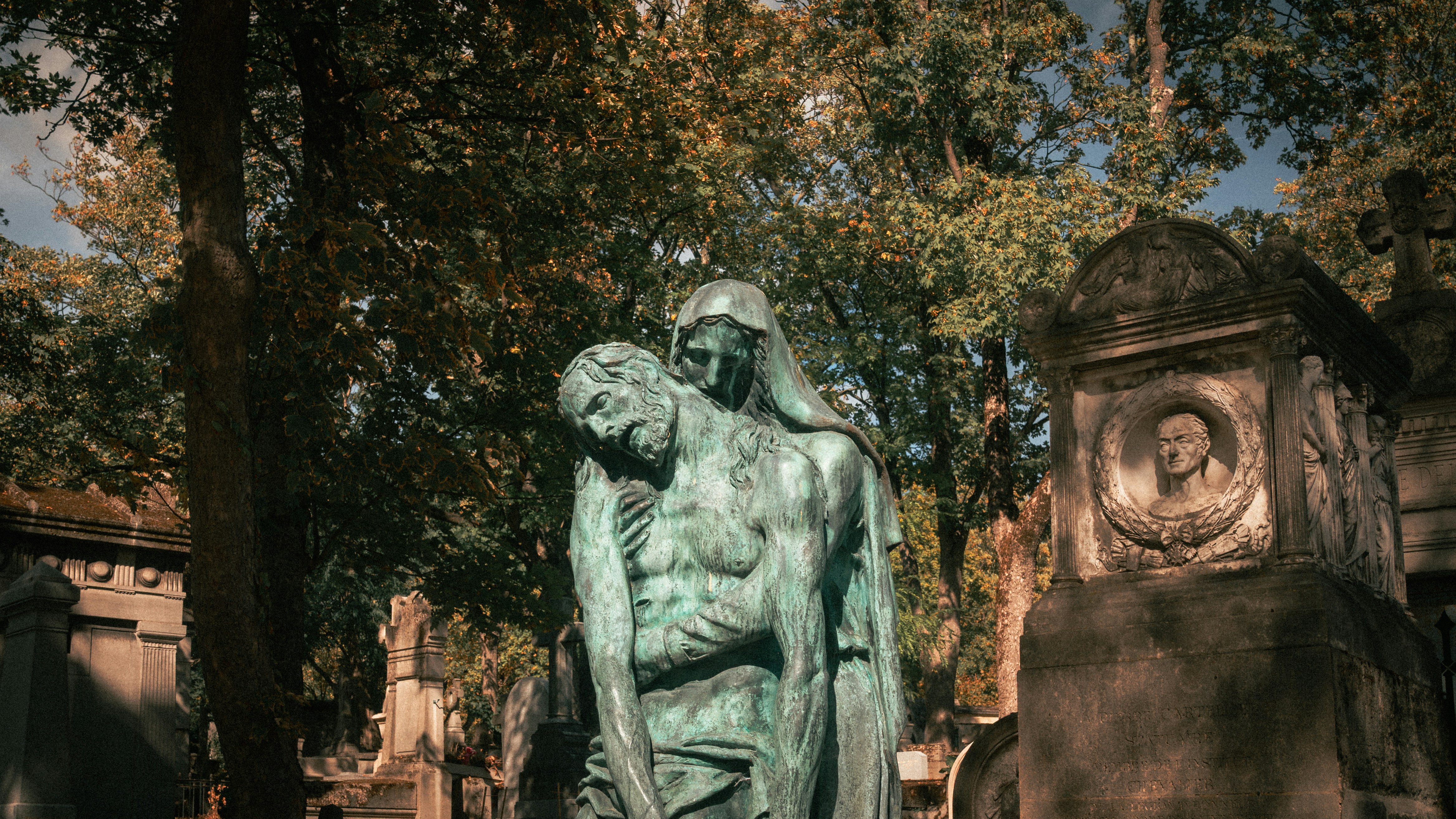 Embrace in Stone: A Veiled Portrait of Loss