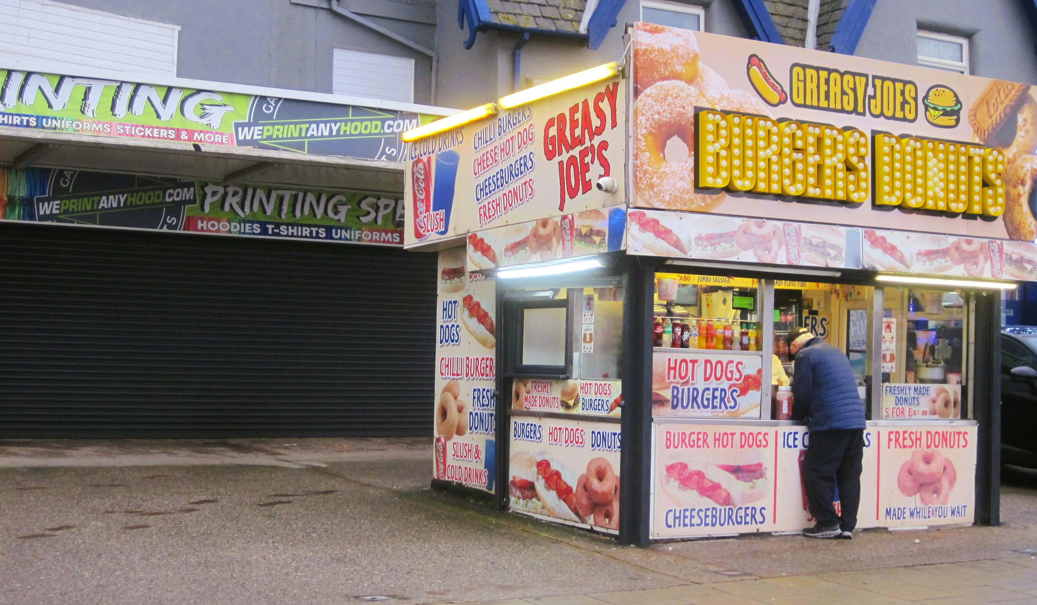 Burger Bus Stop: A Neon-Lit Fast-Food Corner by the Alley
