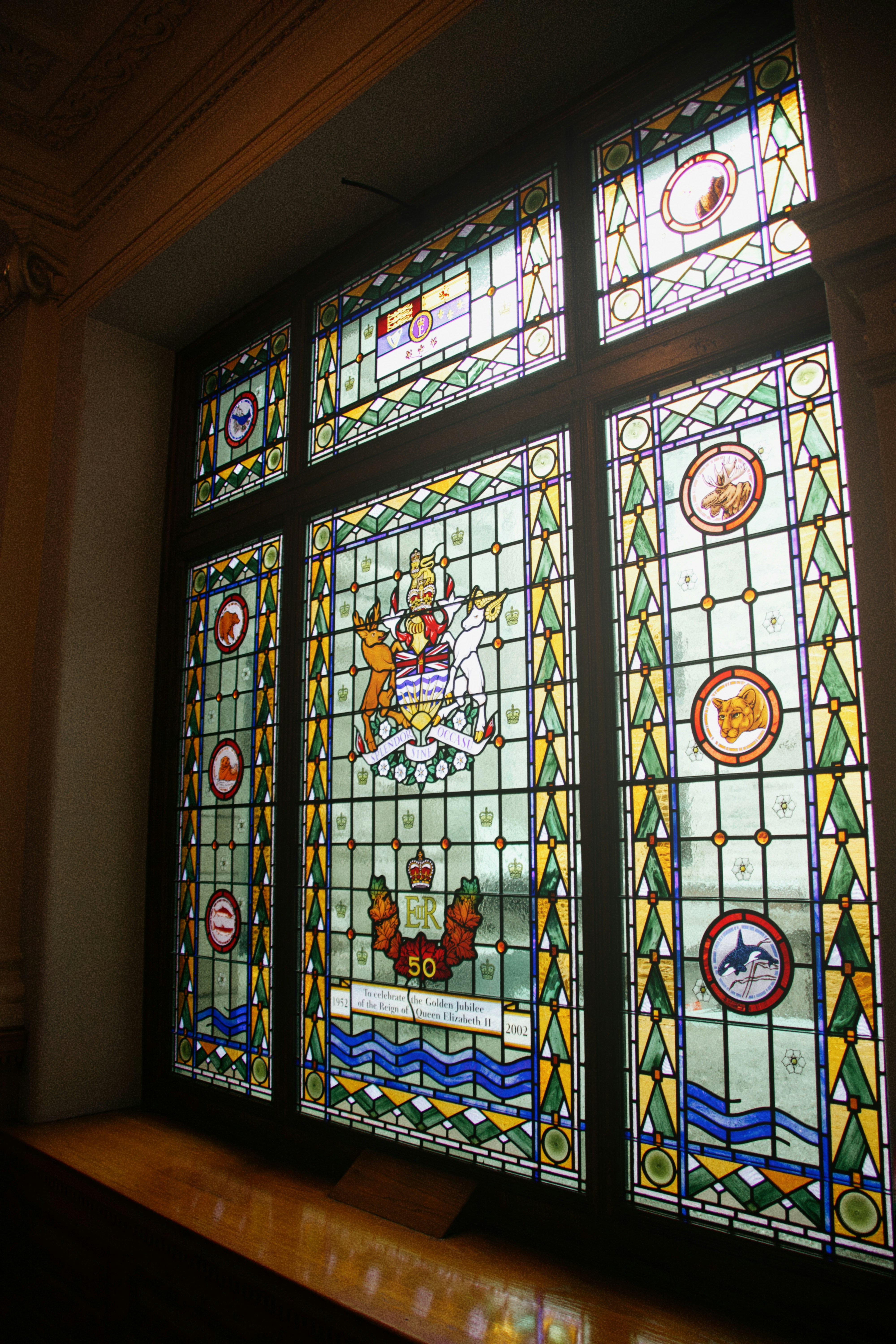 Stained Glass Cathedral Window Inside a Silent Hall
