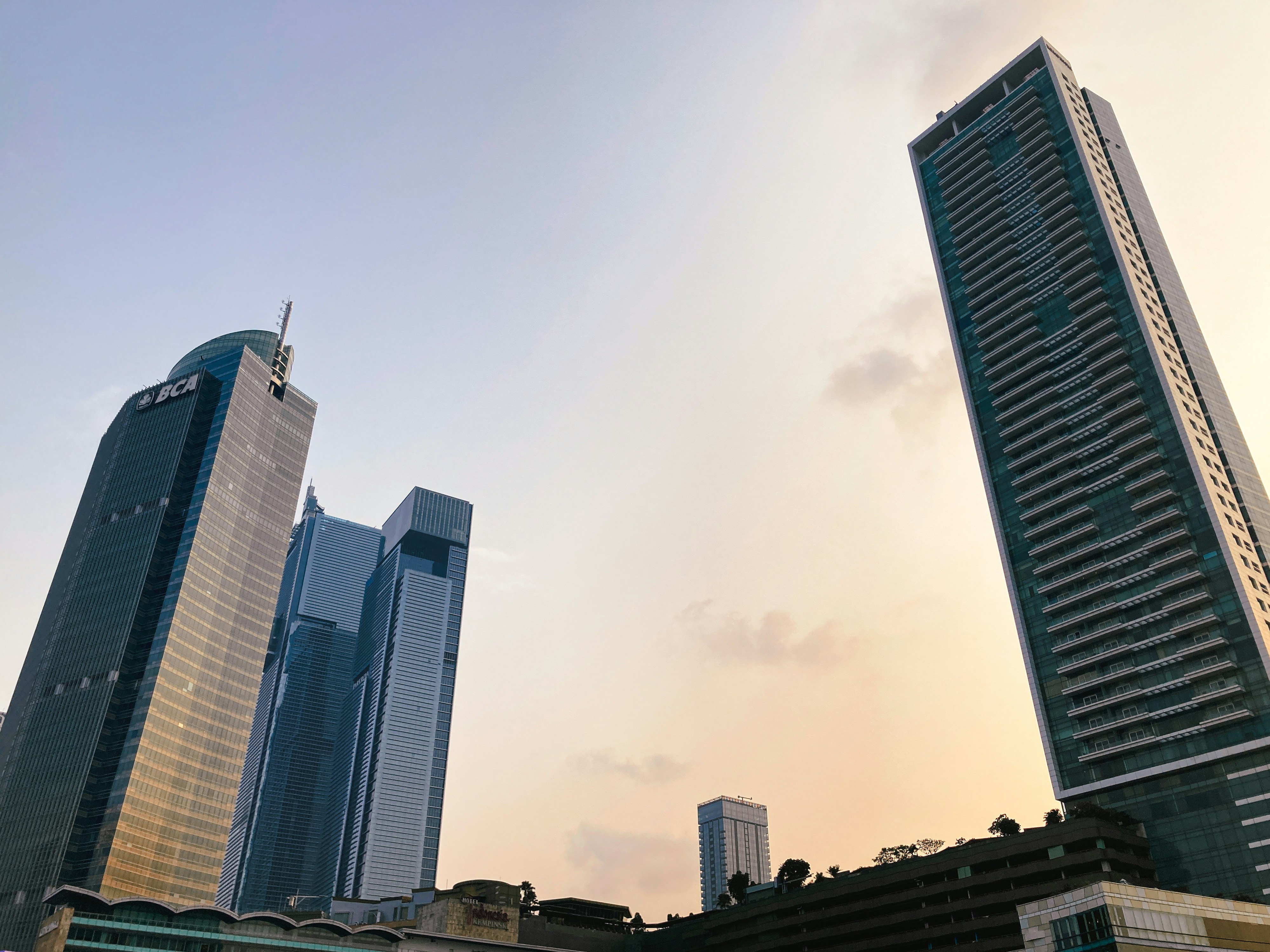 Skyline Ascendant: Sunset over a City of Glass