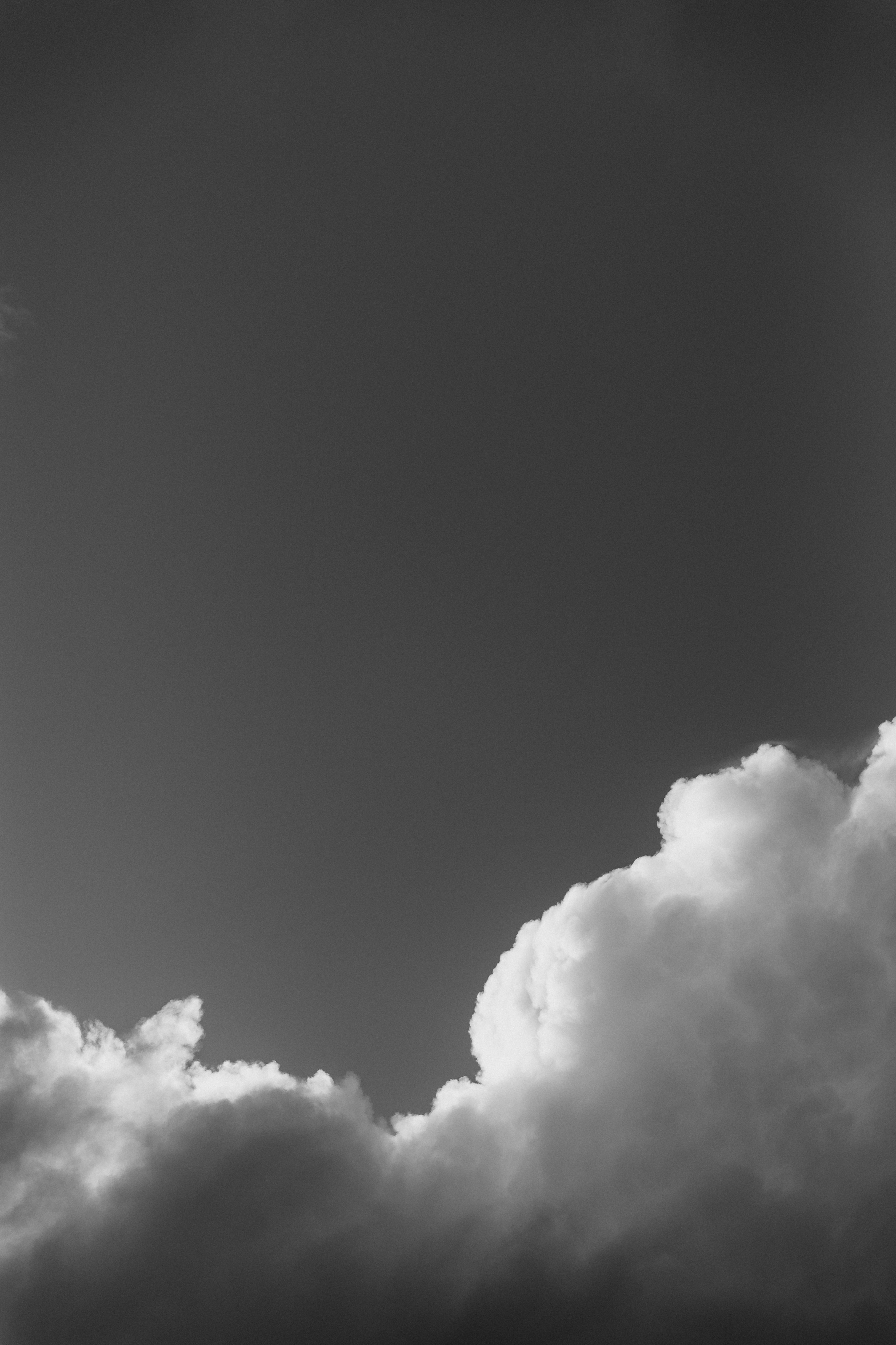 Towering Sky: A Quiet Cloudscape in Monochrome