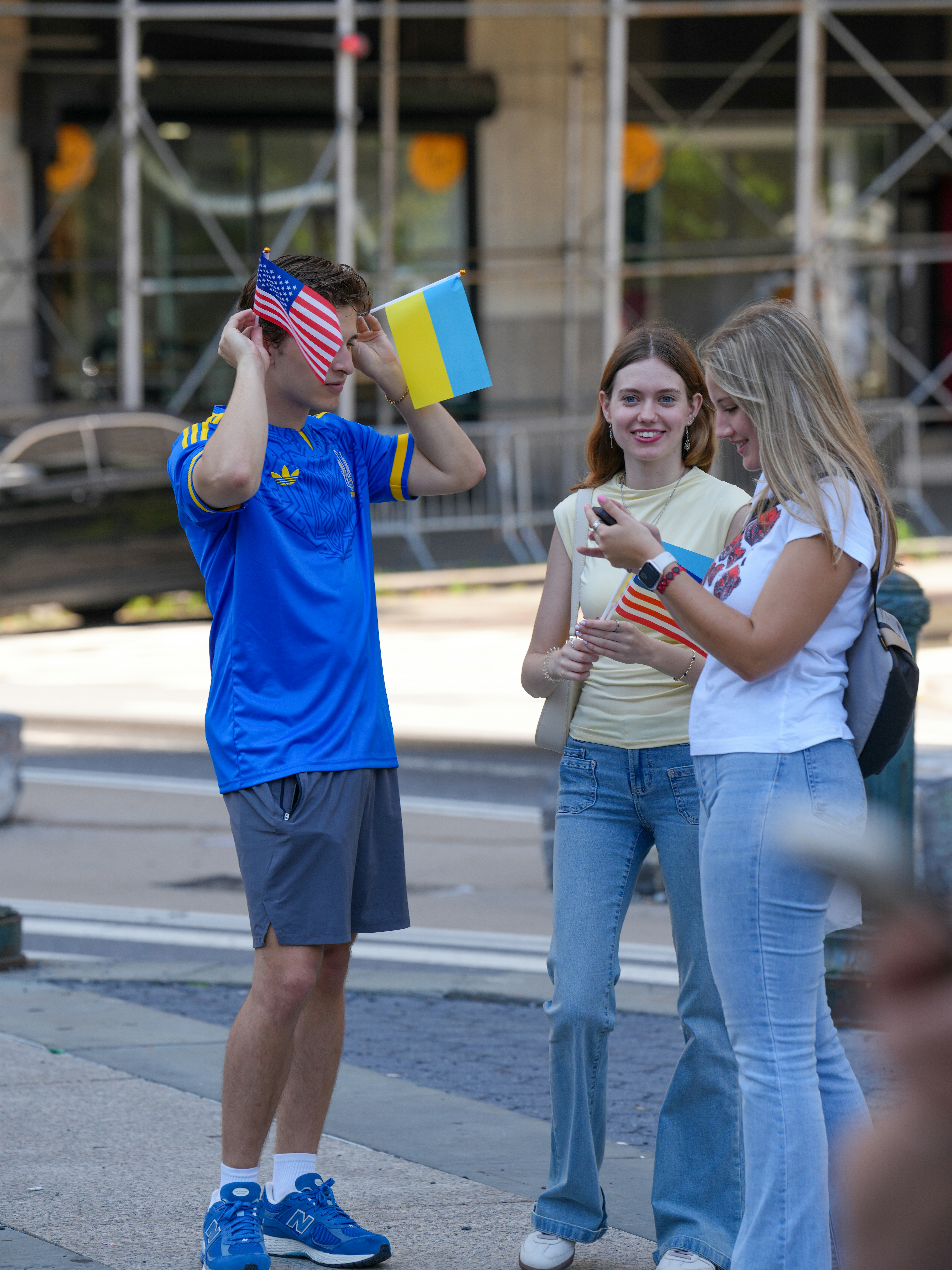 Flags and Friends on a City Street