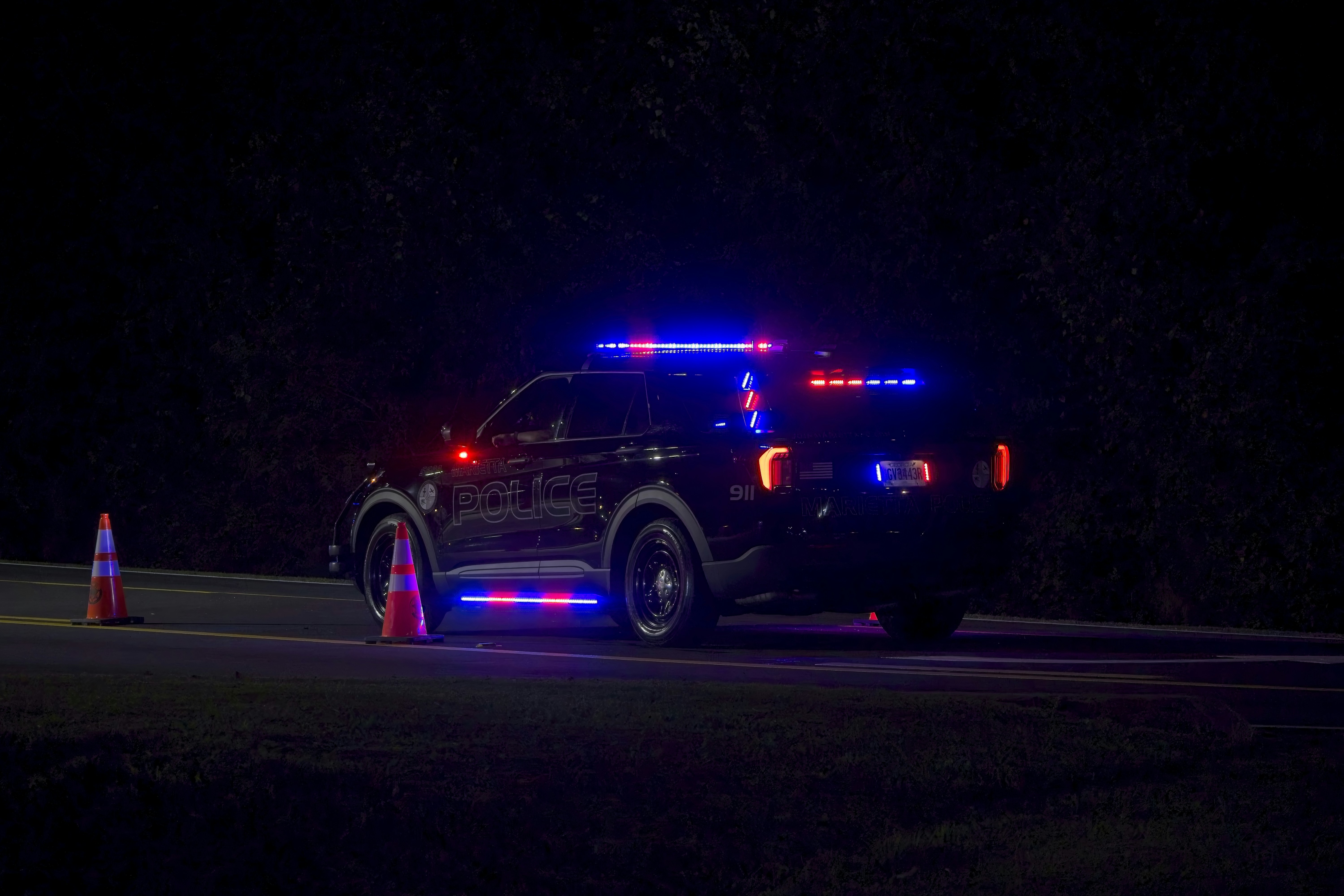 Blue-Red Beacon: A Police Vehicle On Night Patrol