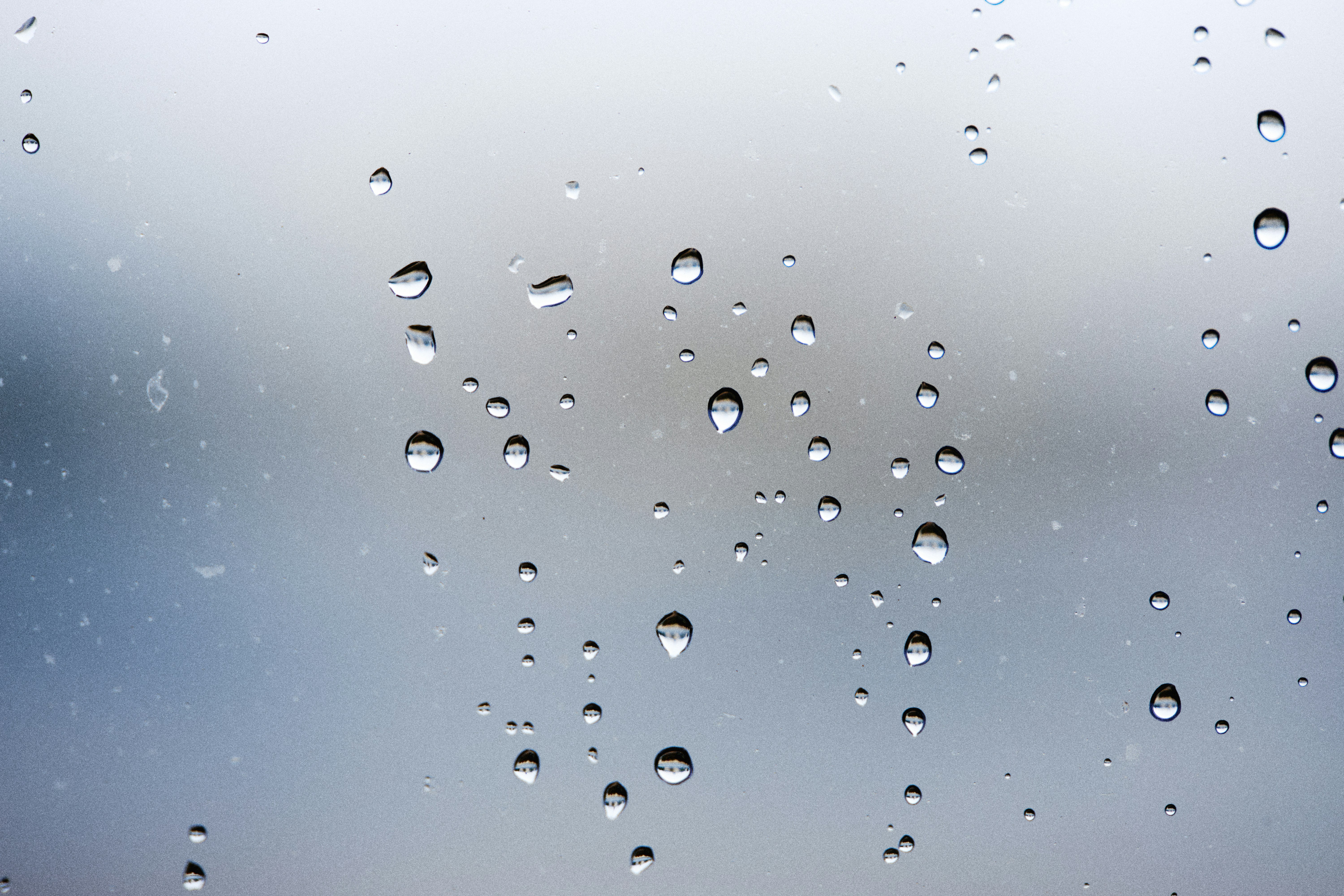 Droplets on Glass: Quiet Rainlight