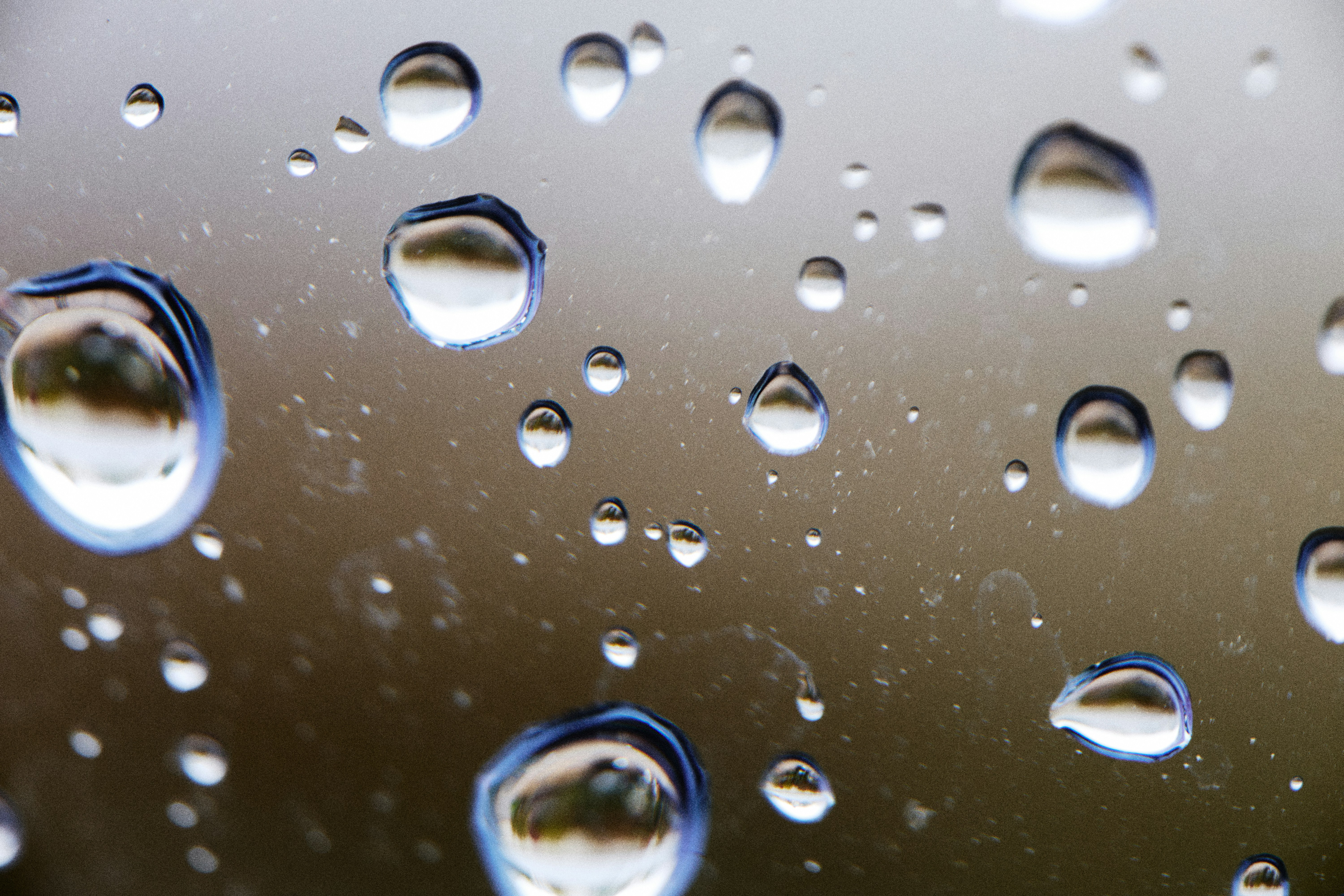 Droplets as Windows: A Macro Mosaic of Glass and Light