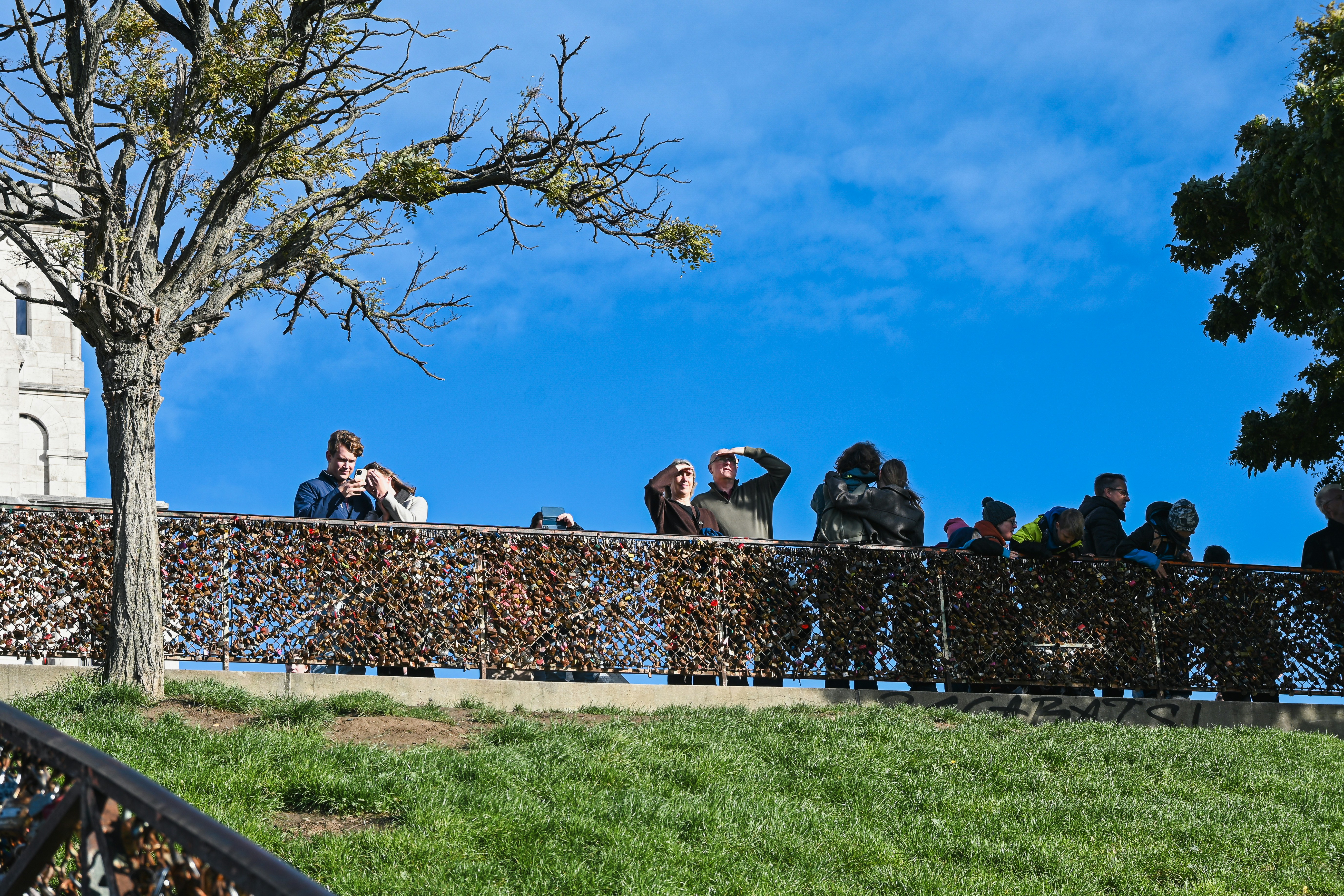 To Lookout Over the Rail: Crowd on a Sunny Terrace