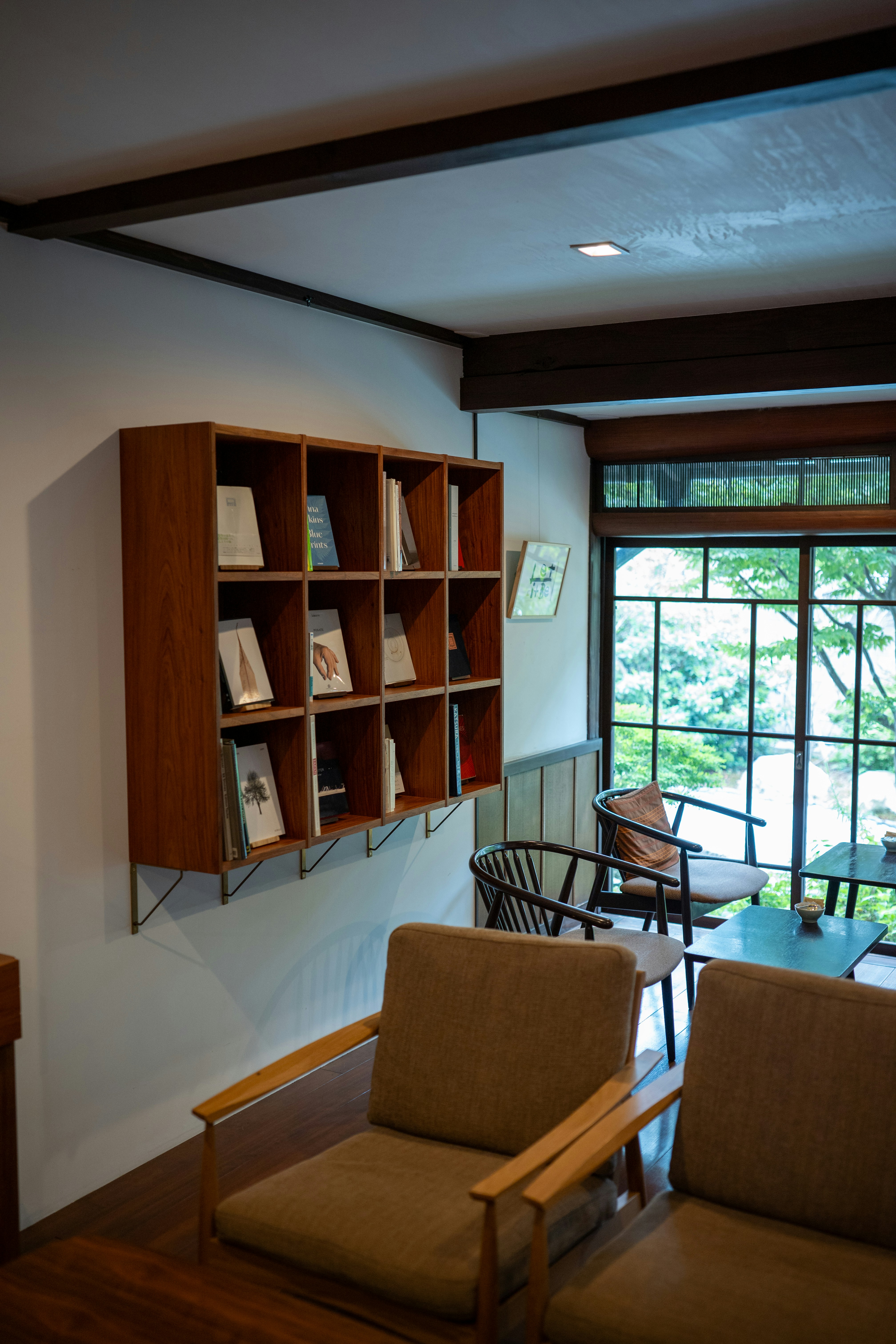 Quiet Reading Nook Under Warm Wood Beams