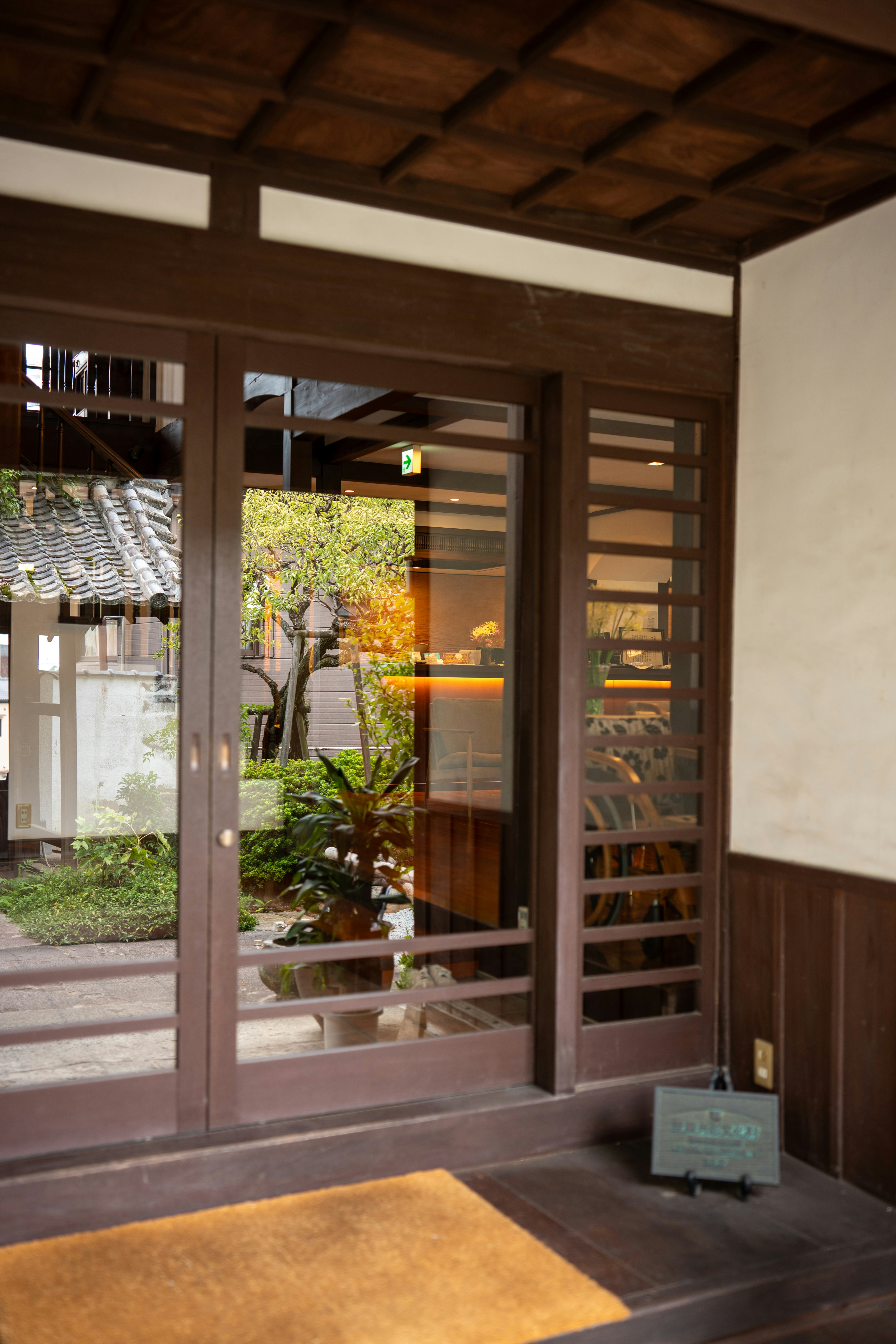 Silent Threshold: A Quiet Entrance Framed by Shoji and Garden