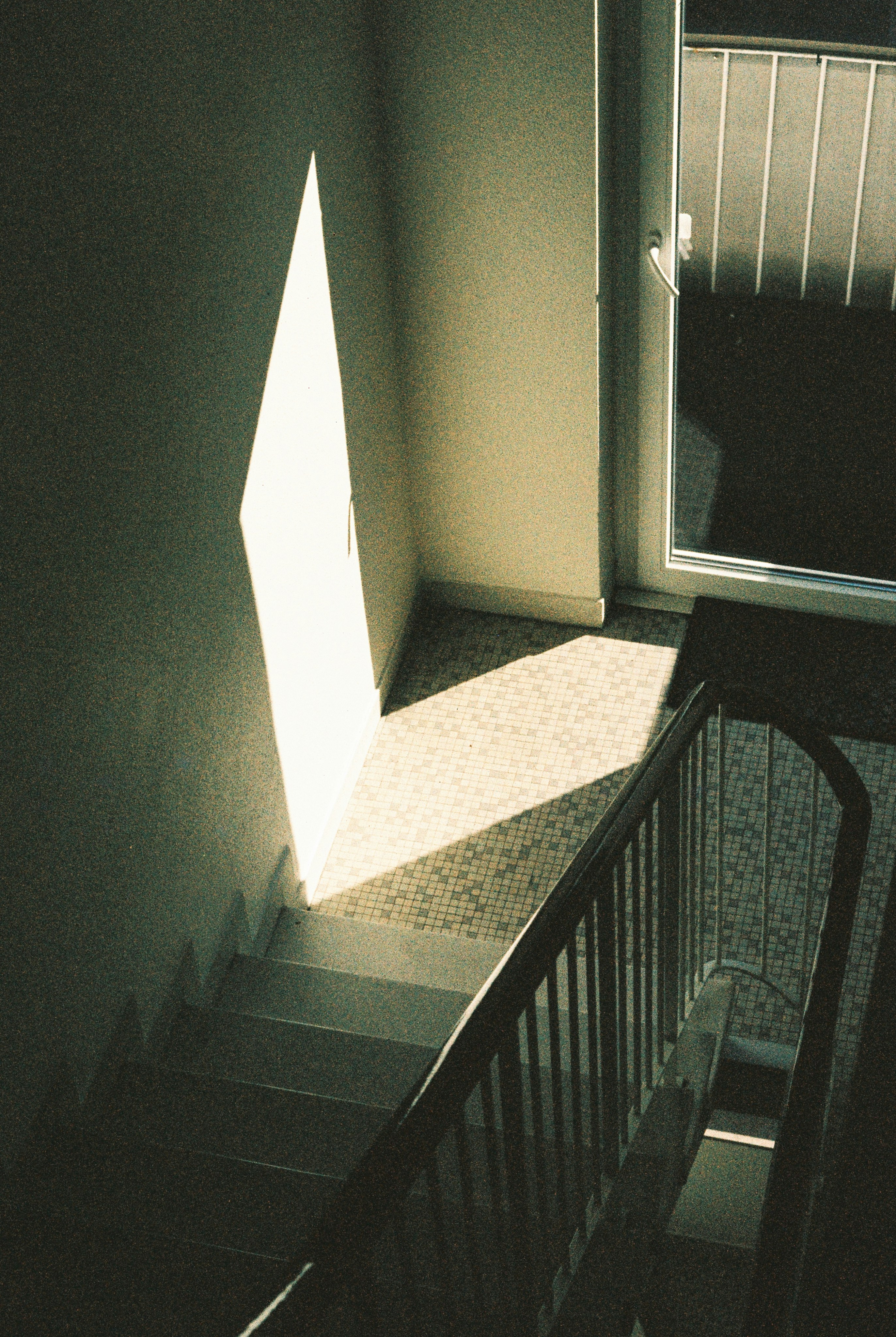 Light Through the Stairwell: An Abstract Echo of Geometry