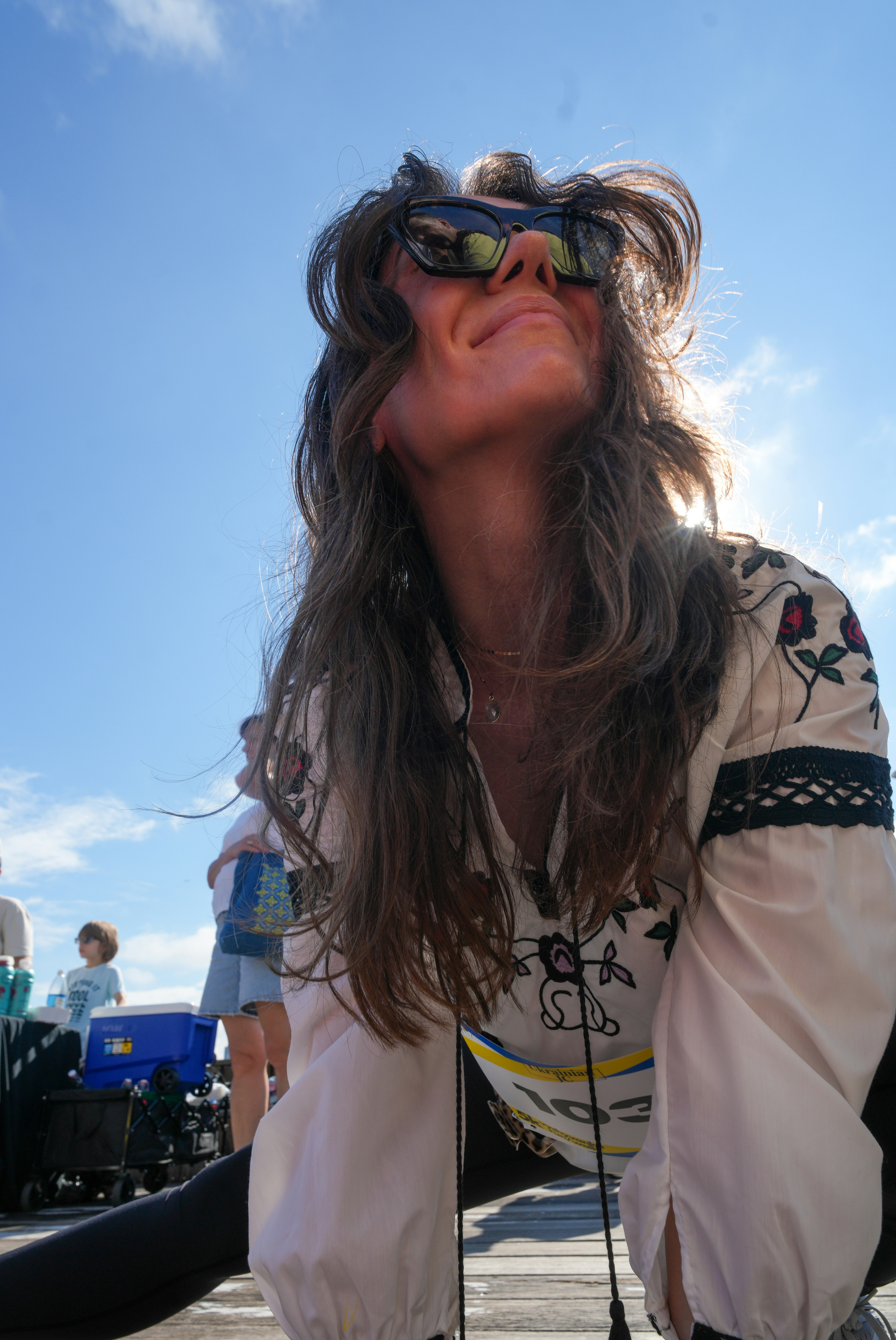 Upward Gaze: A Sunlit Portrait from a Low Angle