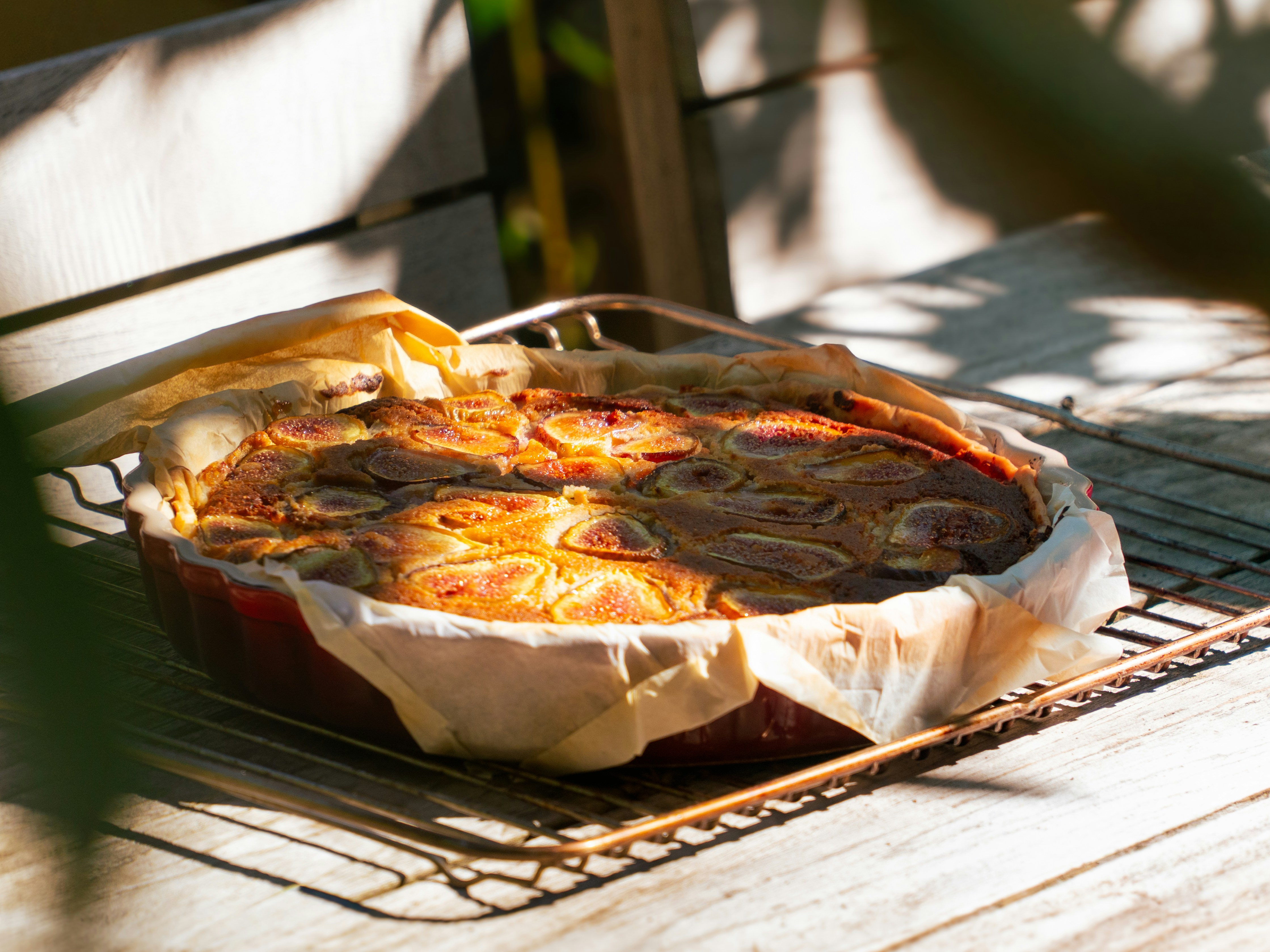 Sunlit Rustic Tart Cooling on a Wire Rack