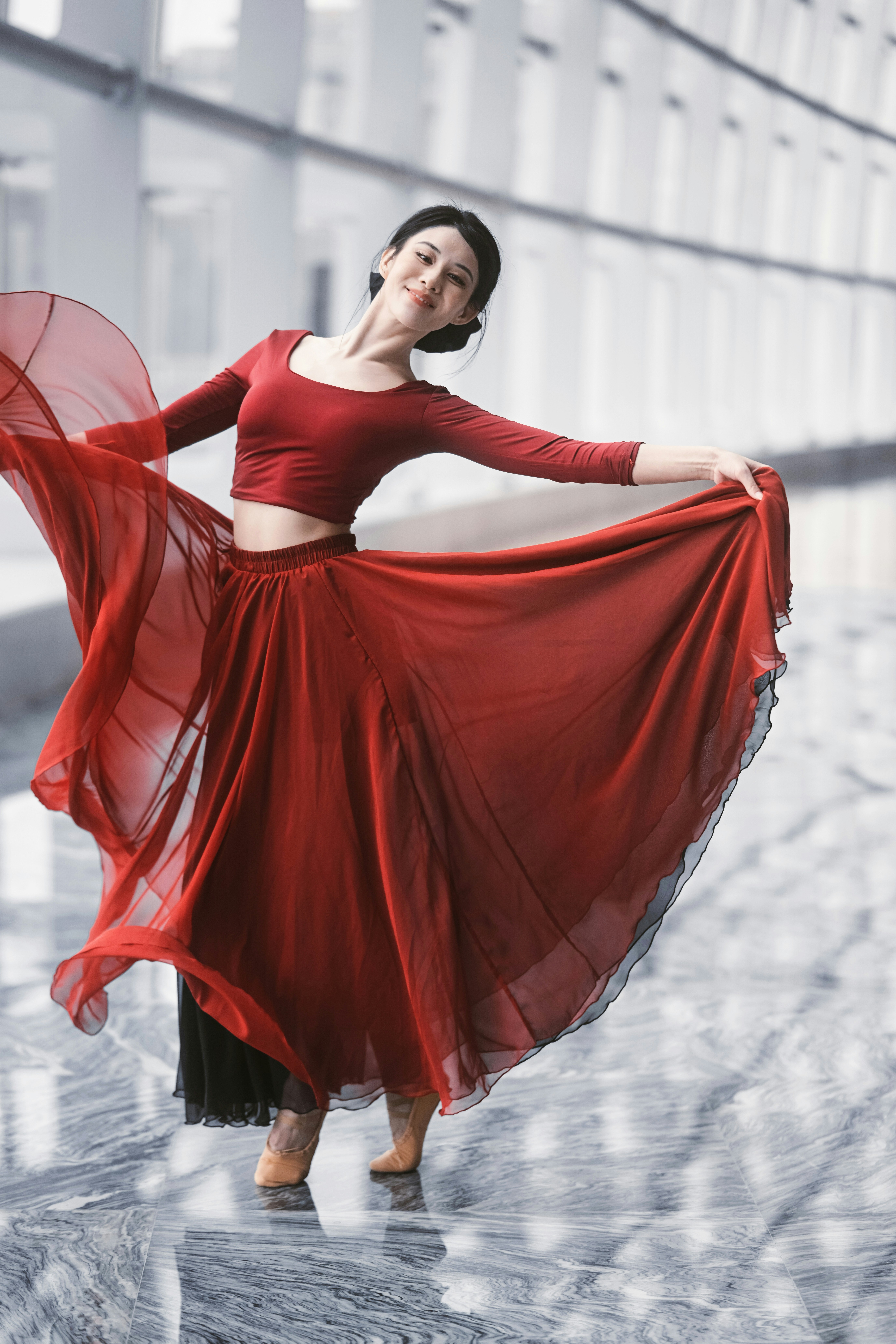 Red Drape in Motion: A Fluid Dance in a Marble Hall