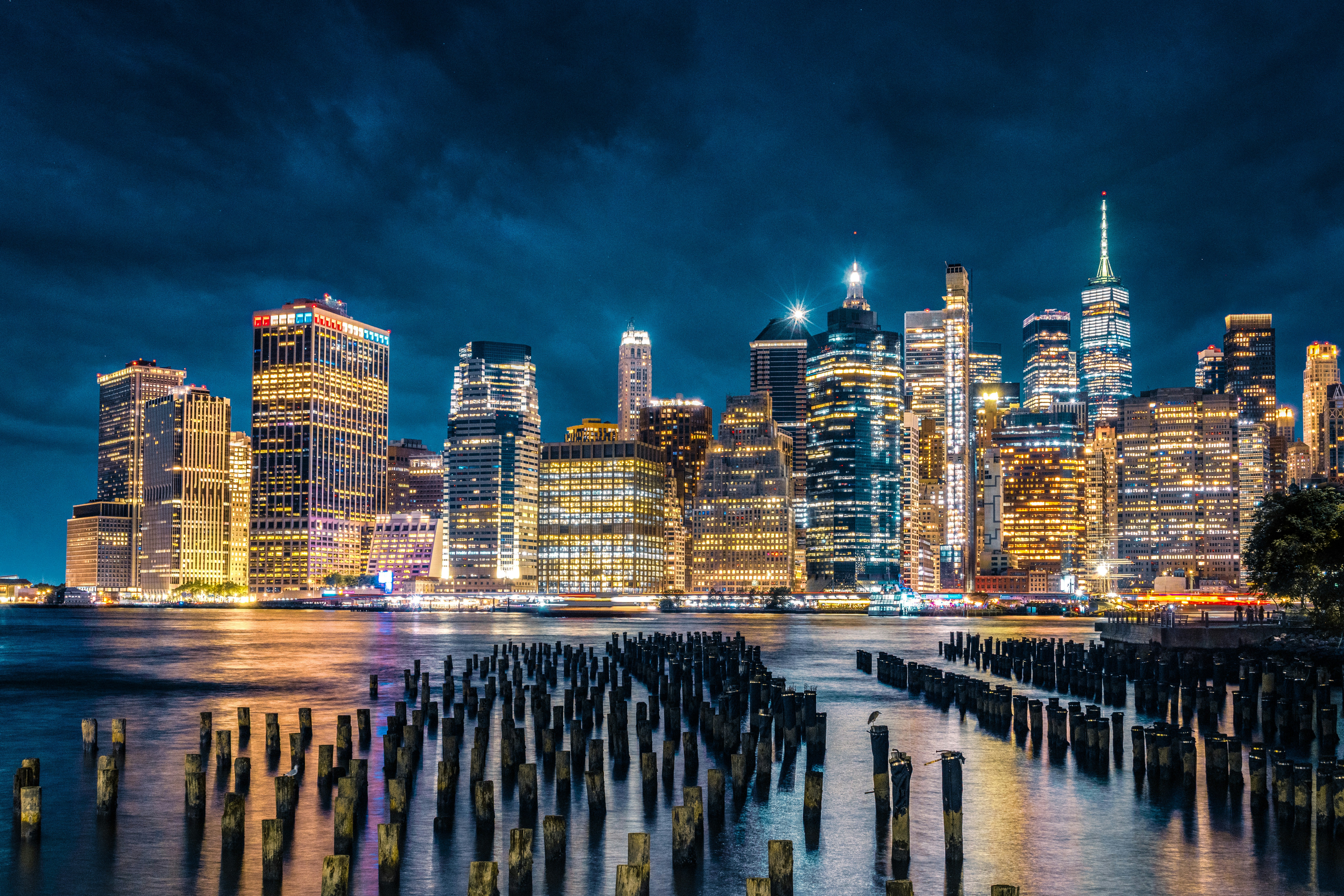 Neon Skyline Over Pier Remnants