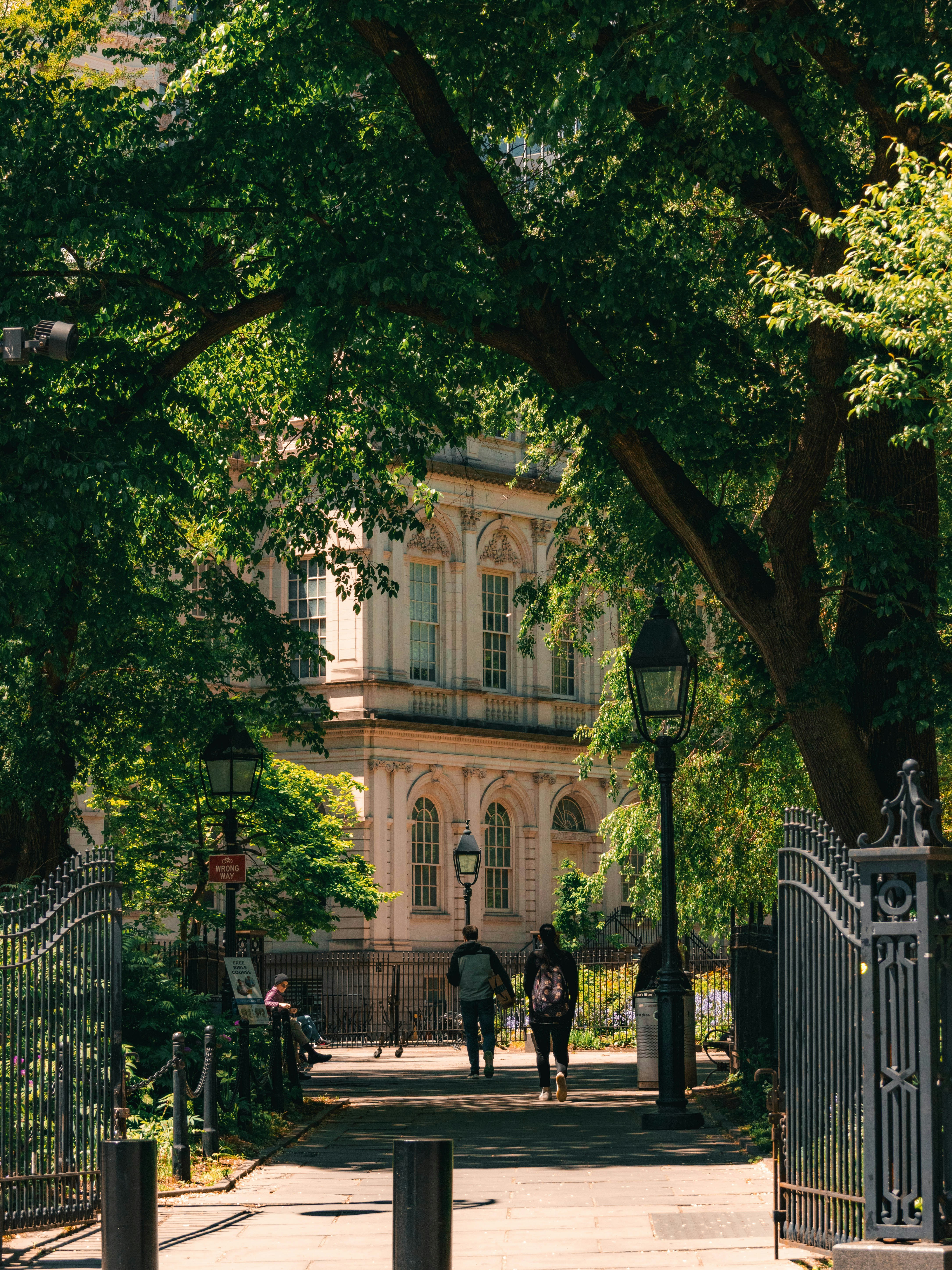 Sunlit Gate: A Quiet Urban Path Through Historic Ironwork