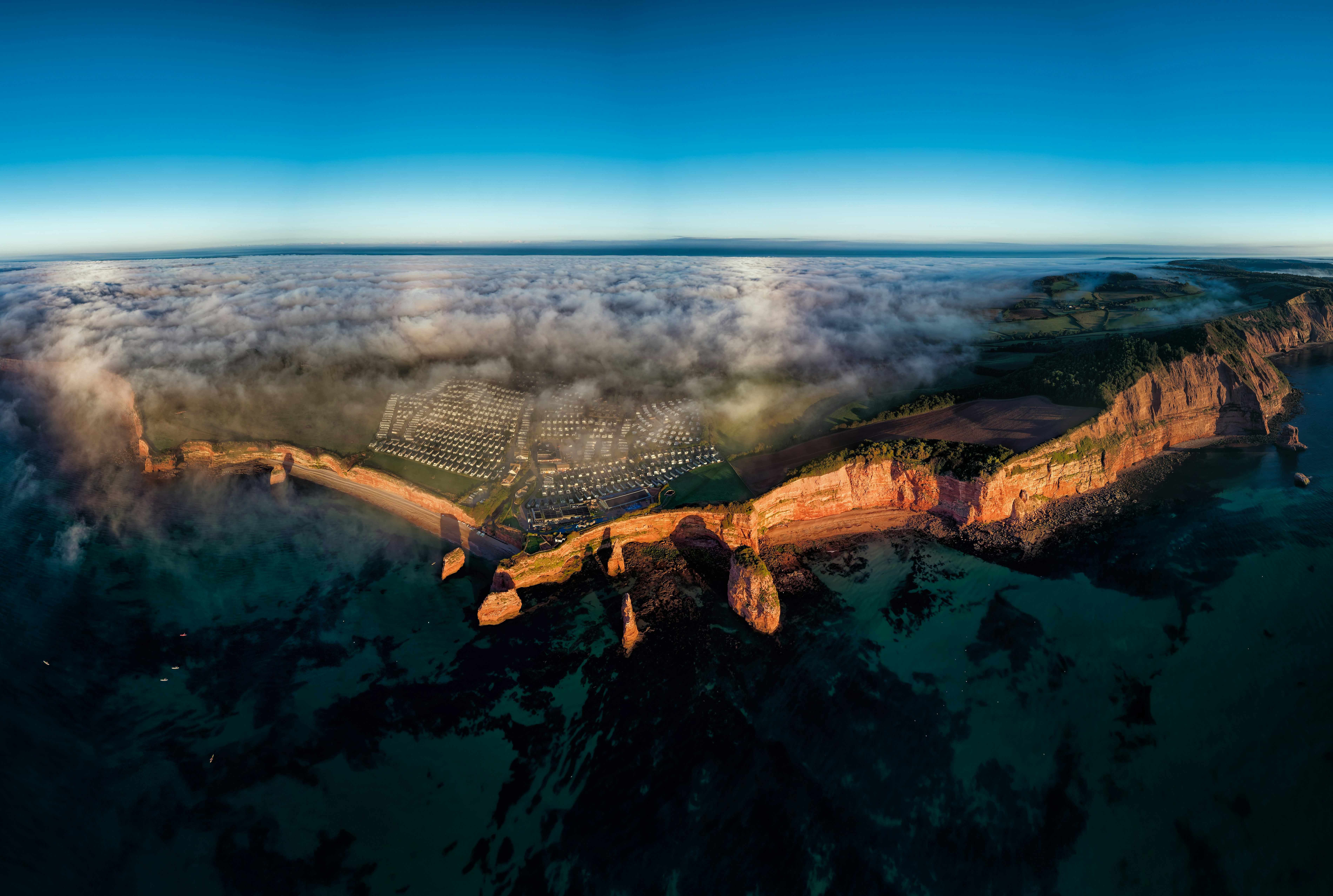 Cliffside Terrace beneath a Misty Horizon