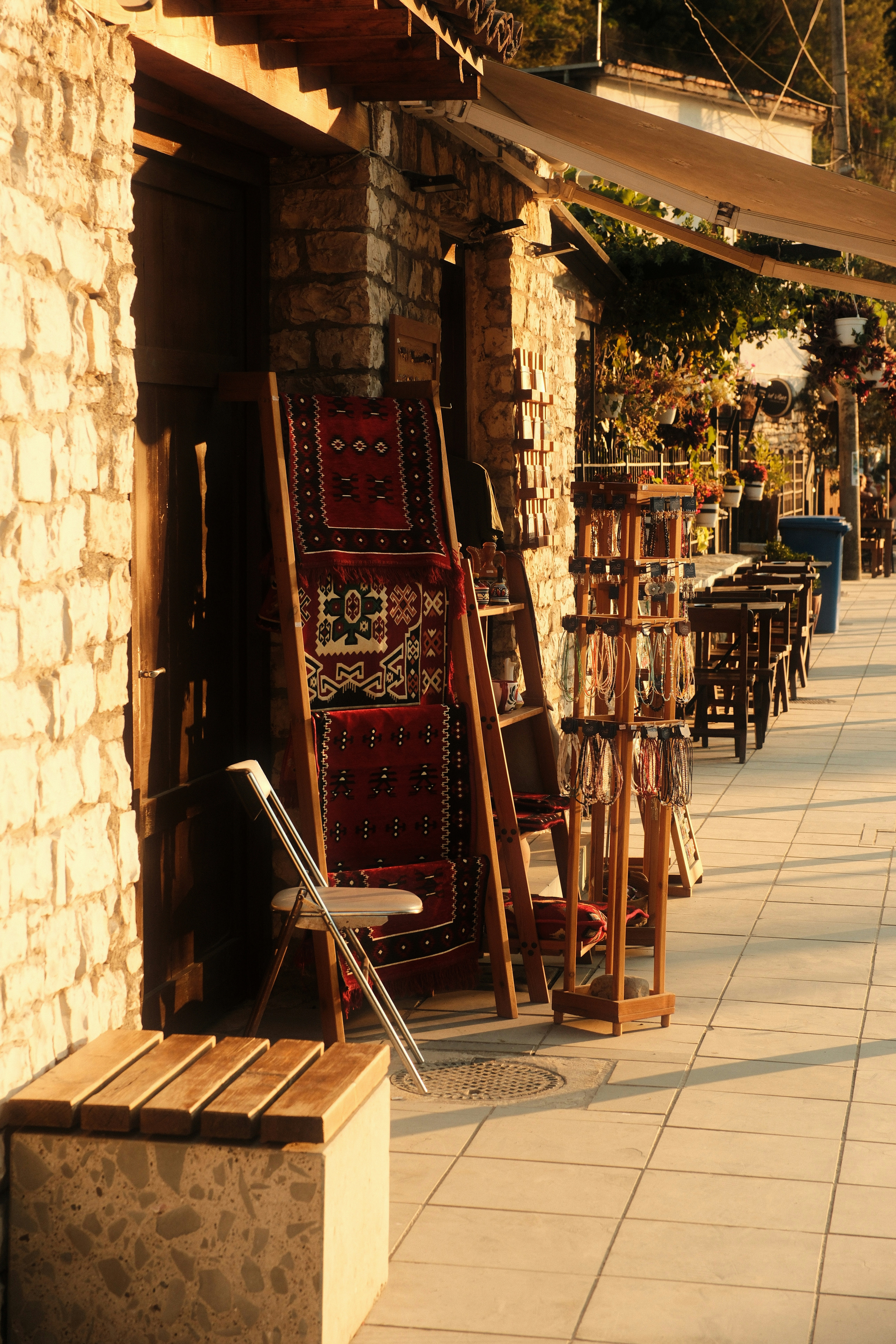 Sunlit Streetfront of a Stone-Shop Veiled in Warm Evening Glow