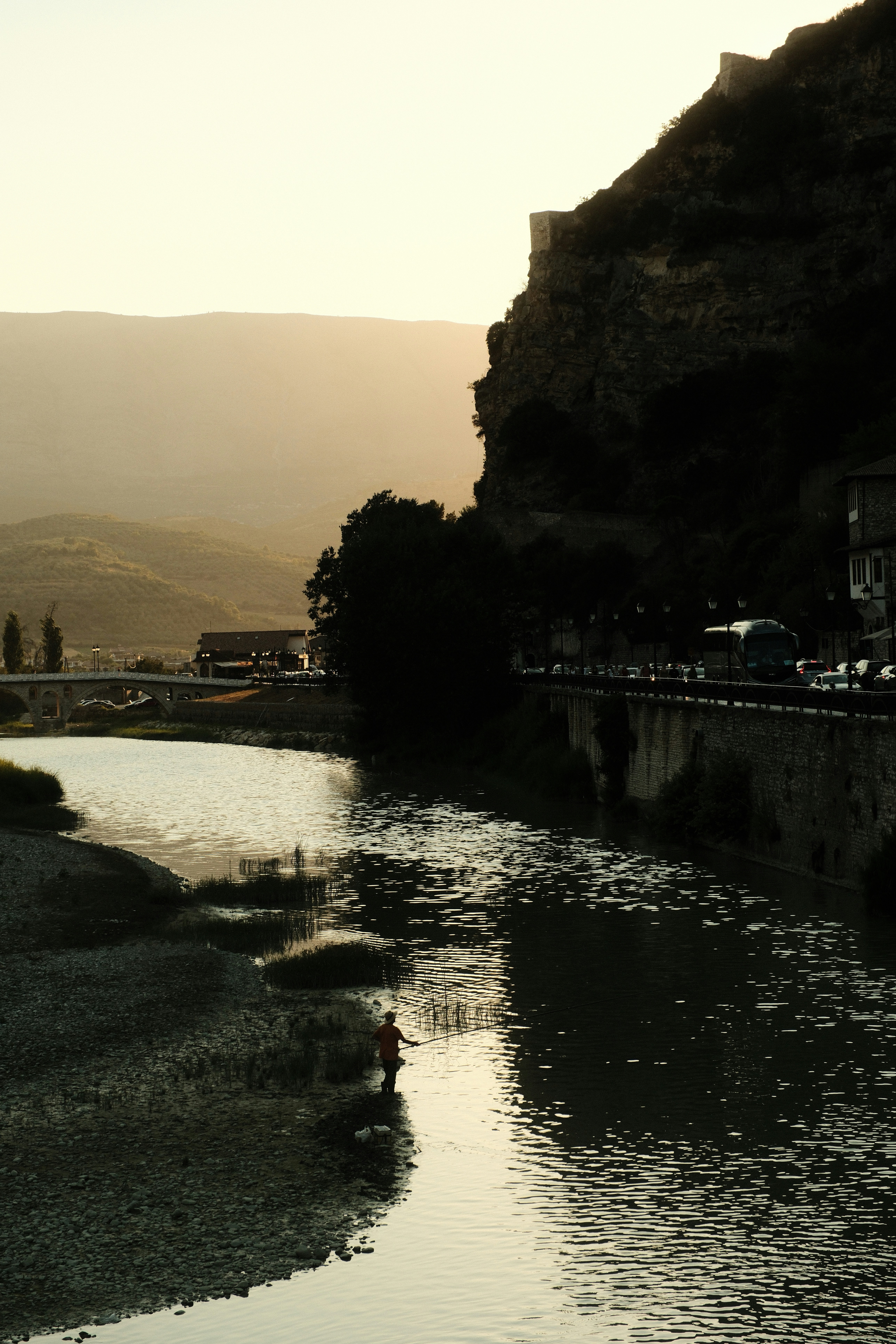 Riverbend at Dusk: A Quiet City Edge Beside the Cliff