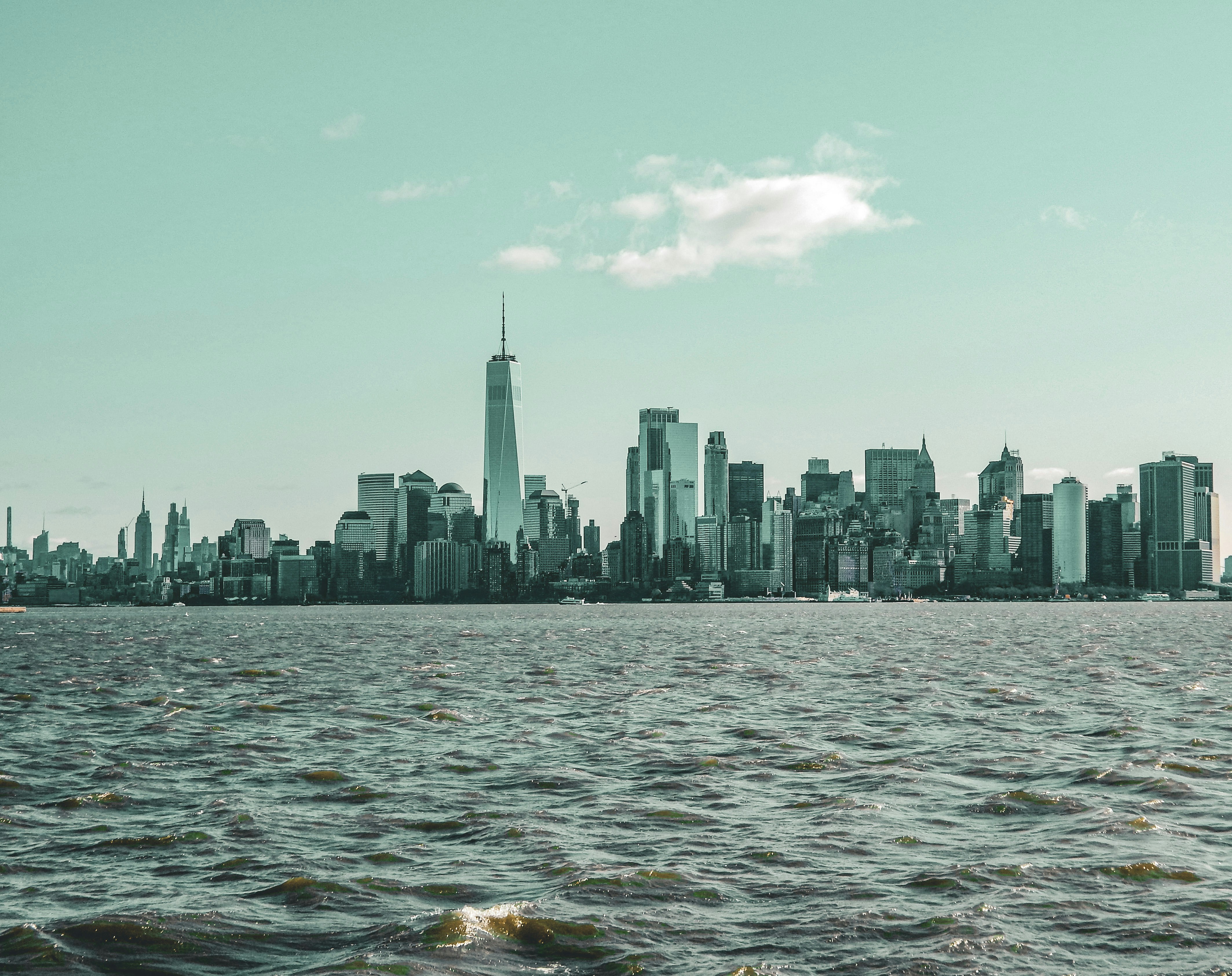City on the Horizon: Manhattan Silhouette Across a Rippling Bay