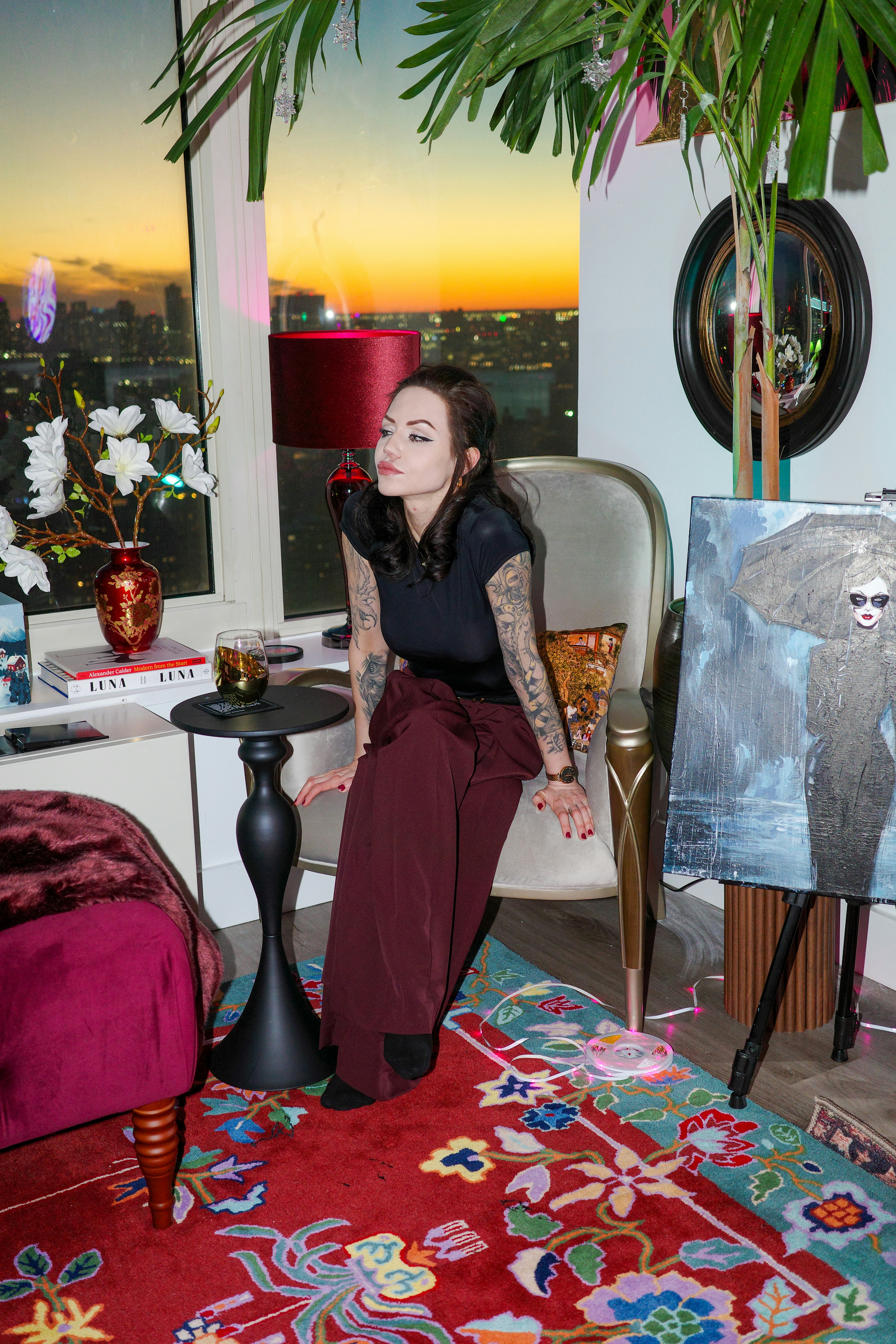Centerstage in a City Loft: Velvet, Plants, and Portraits