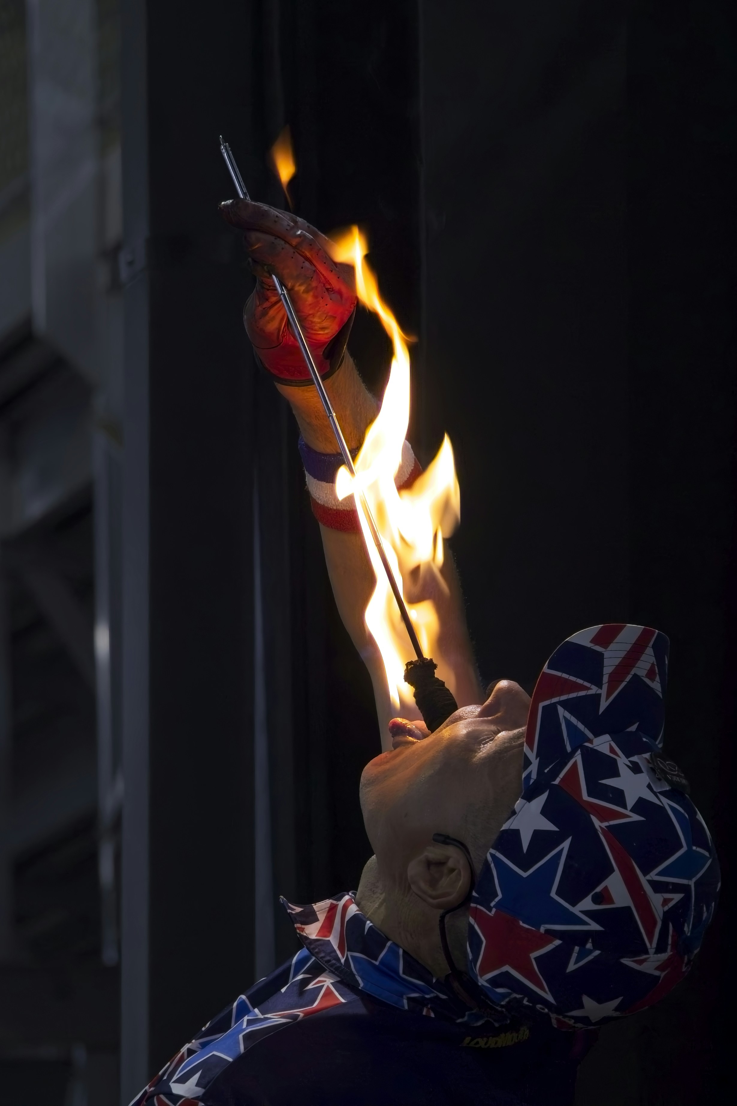 Flame and Flag: A Fire-Drill Performer in Heroic Profile