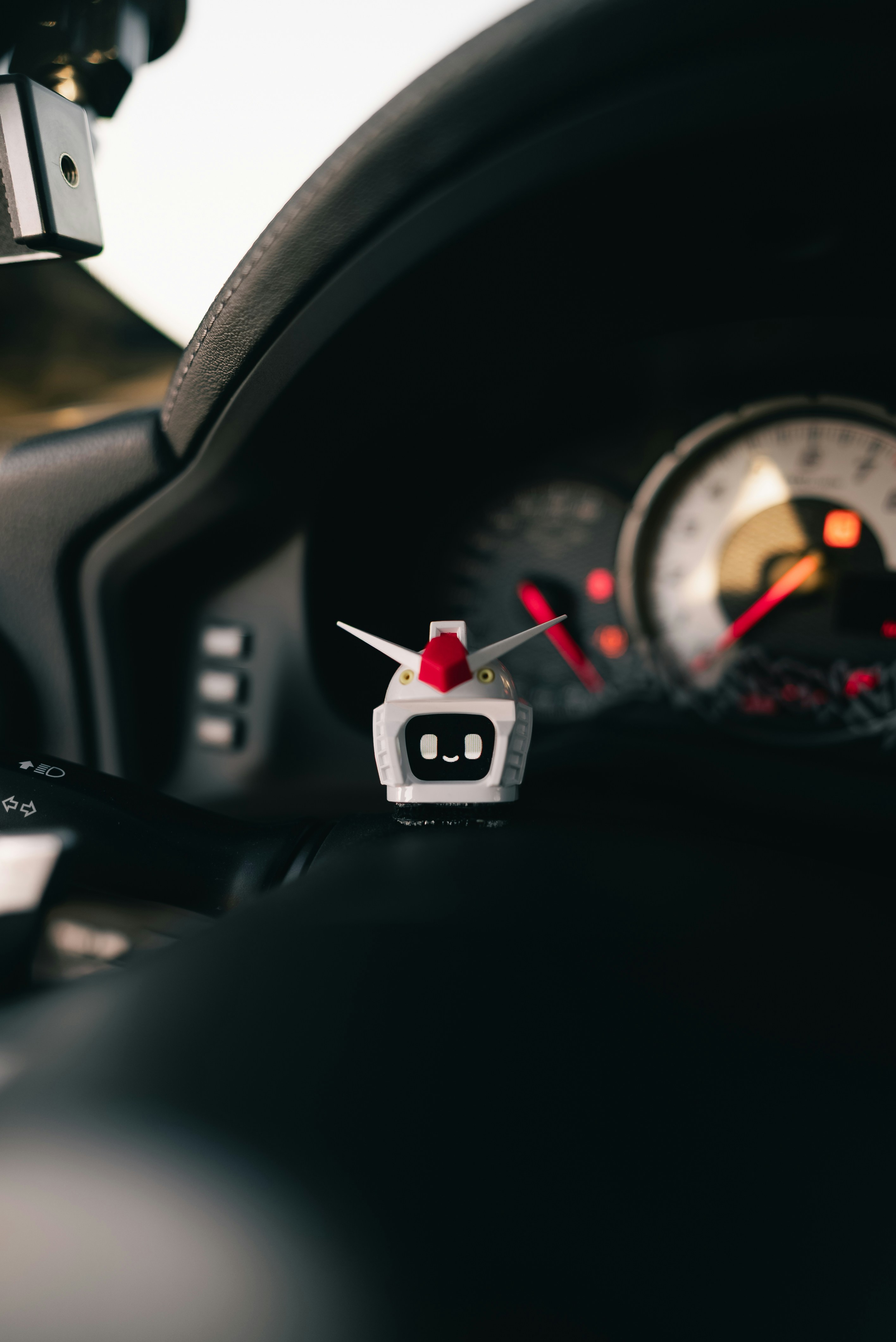 Tiny Co-Pilot on the Dashboard: A Robot Motif in a Car Cabin