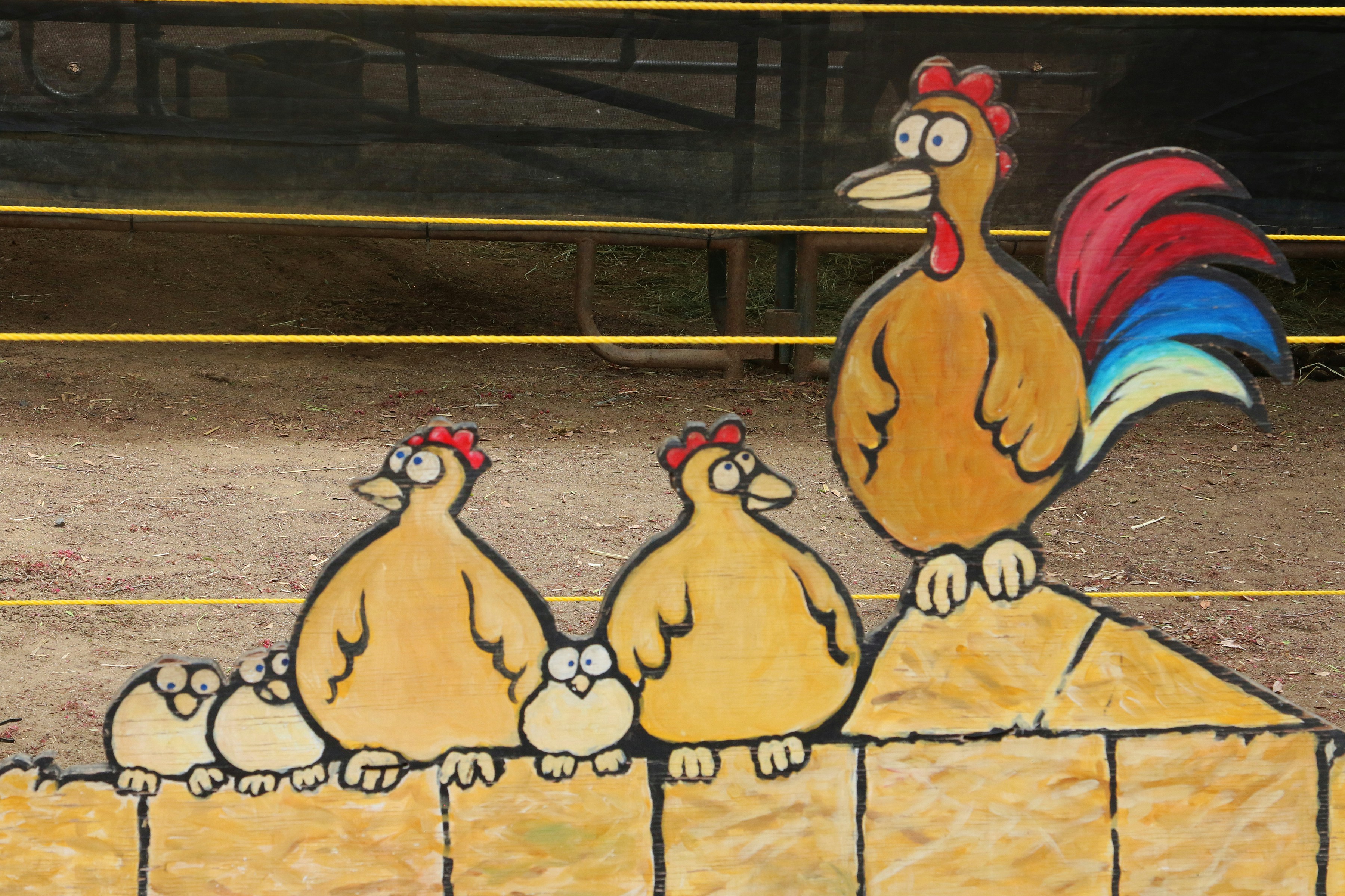 Family of Chickens on a Painted Wall: A Playful Farm Scene
