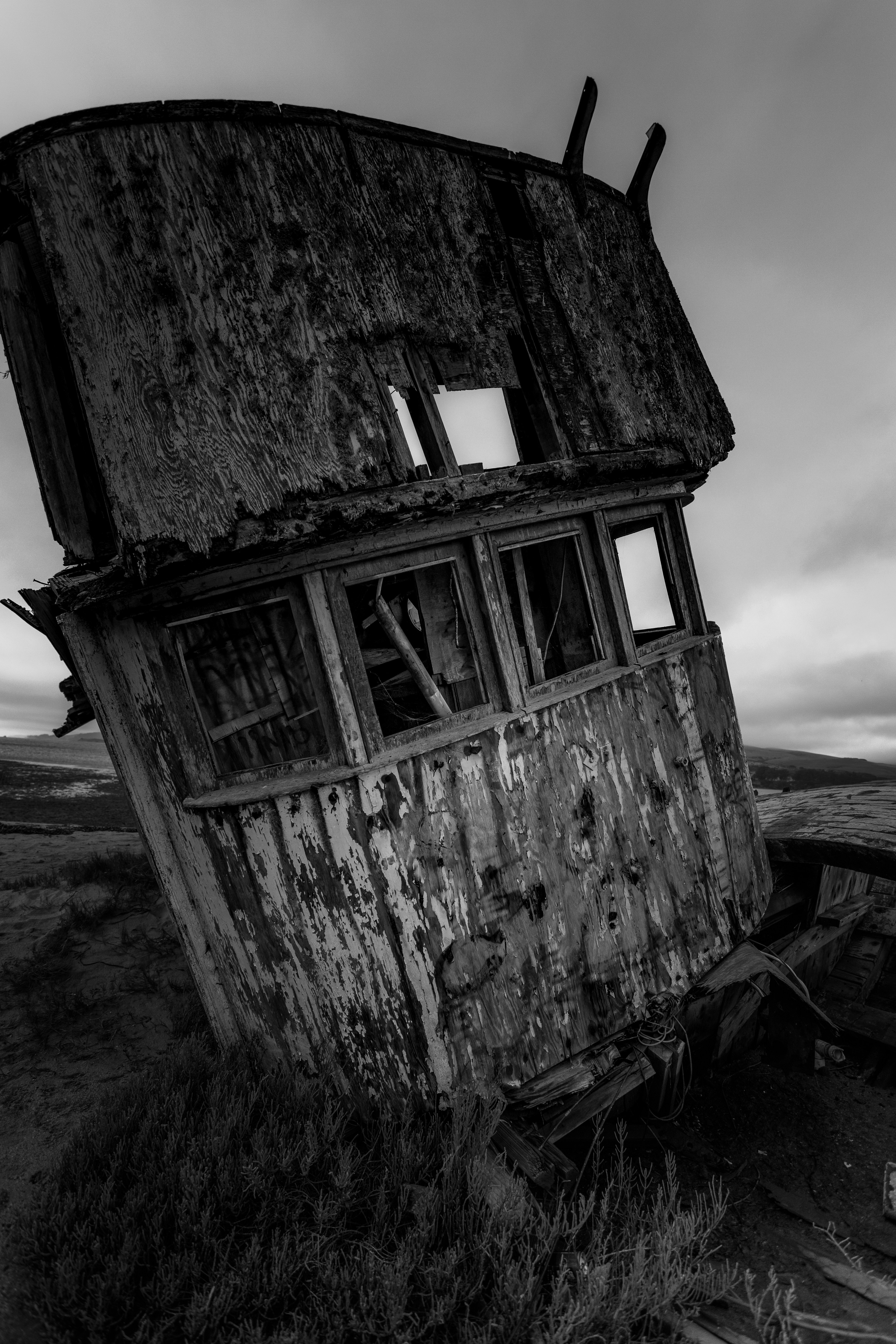 Rotting Lookout: A Weathered Cab Over the Plain