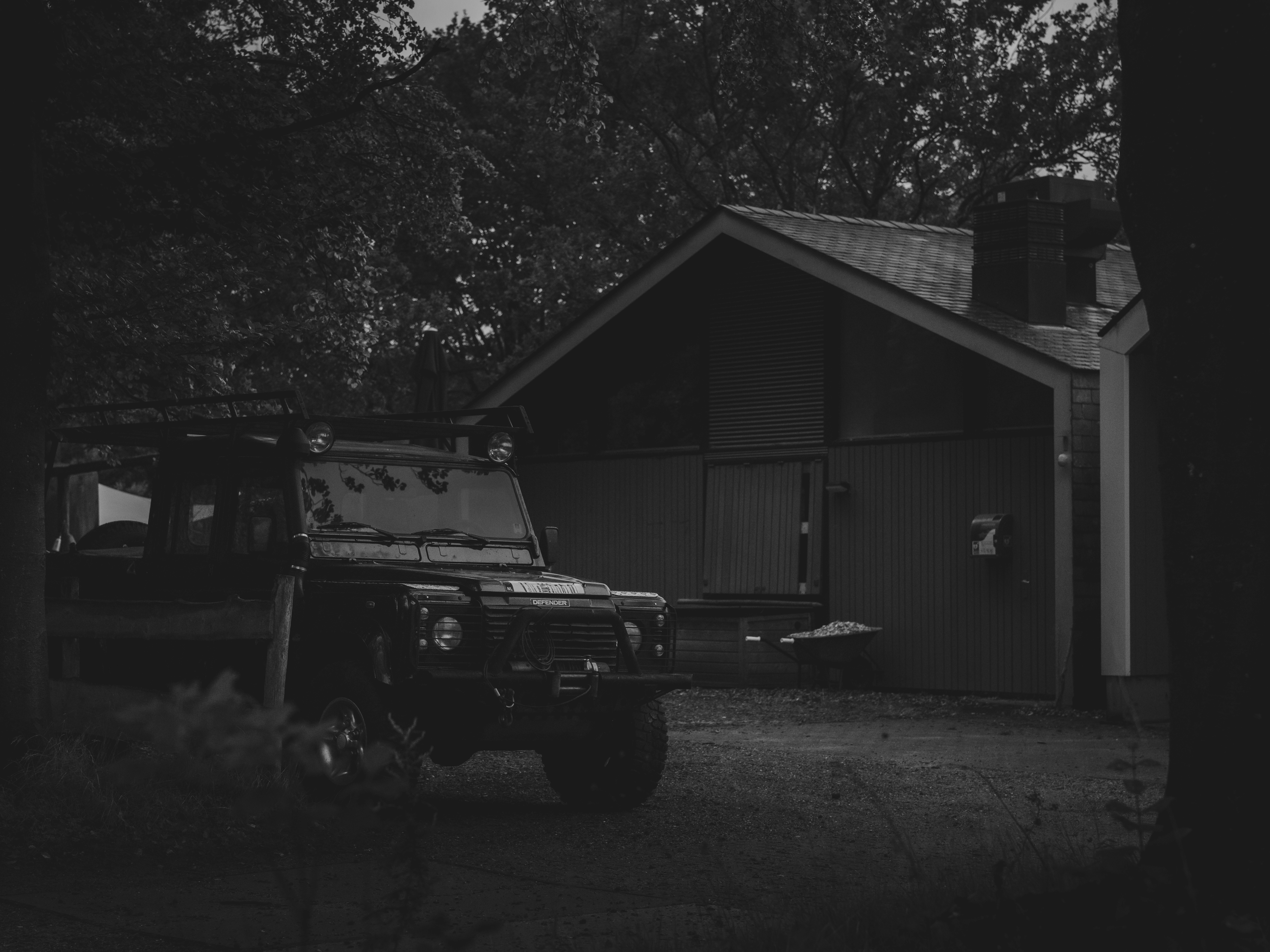 Midnight Outpost: A Deserted Garage and a Suspended Jeep