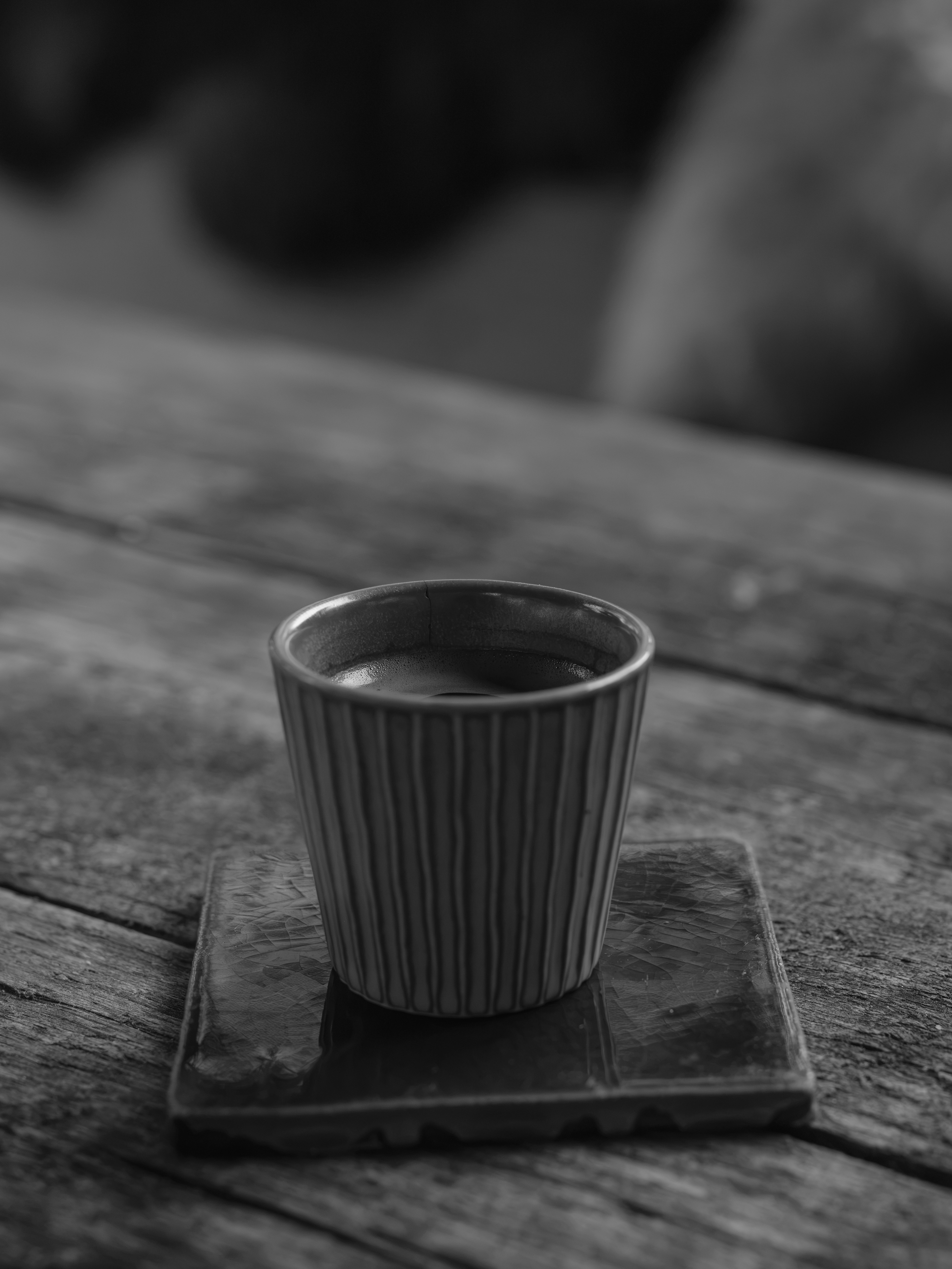 Ceramic Cup on a Weathered Wooden Table