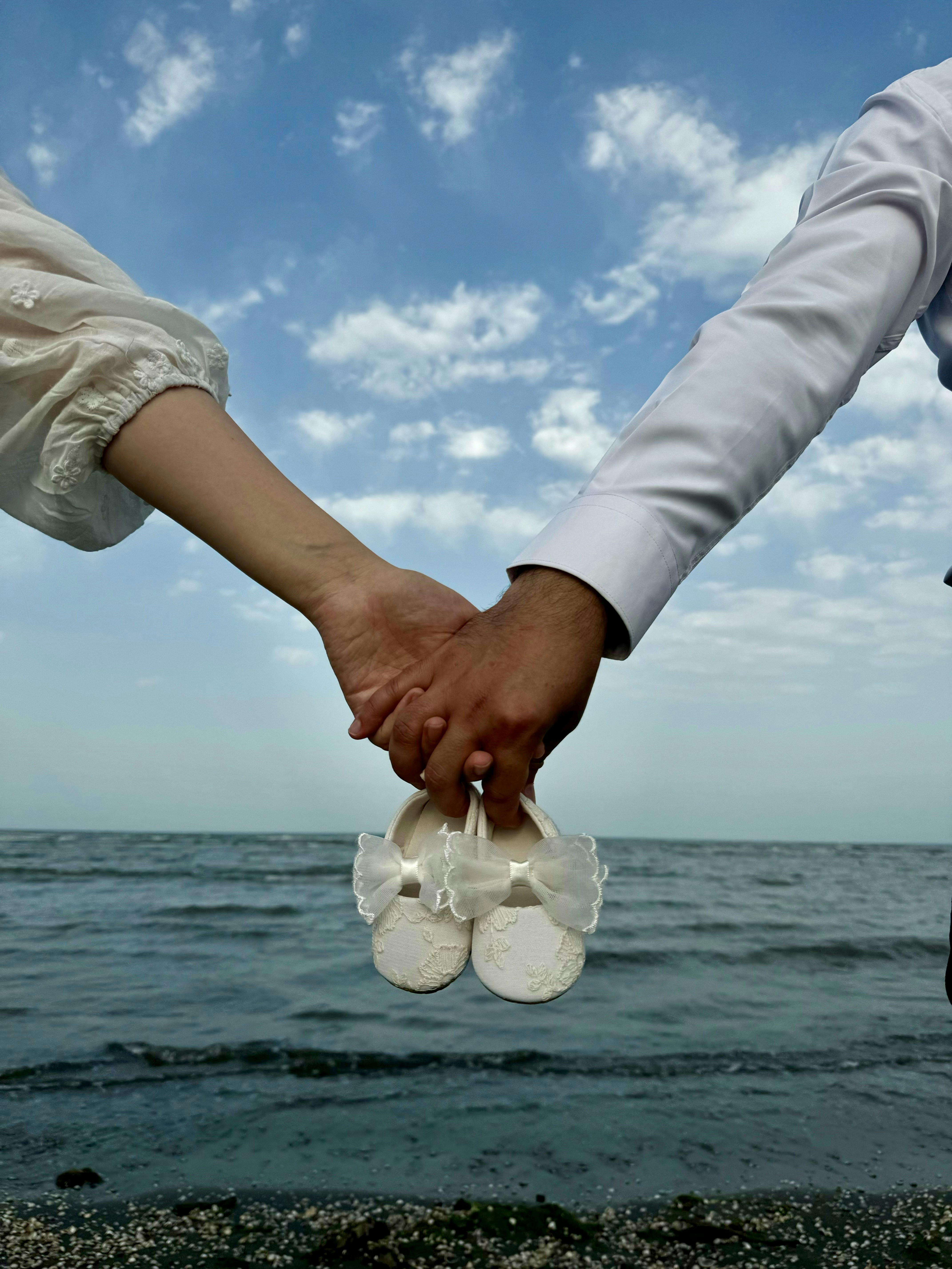 Holding on by a Sea Breeze: A Shared Moment in Flip-Flop Light